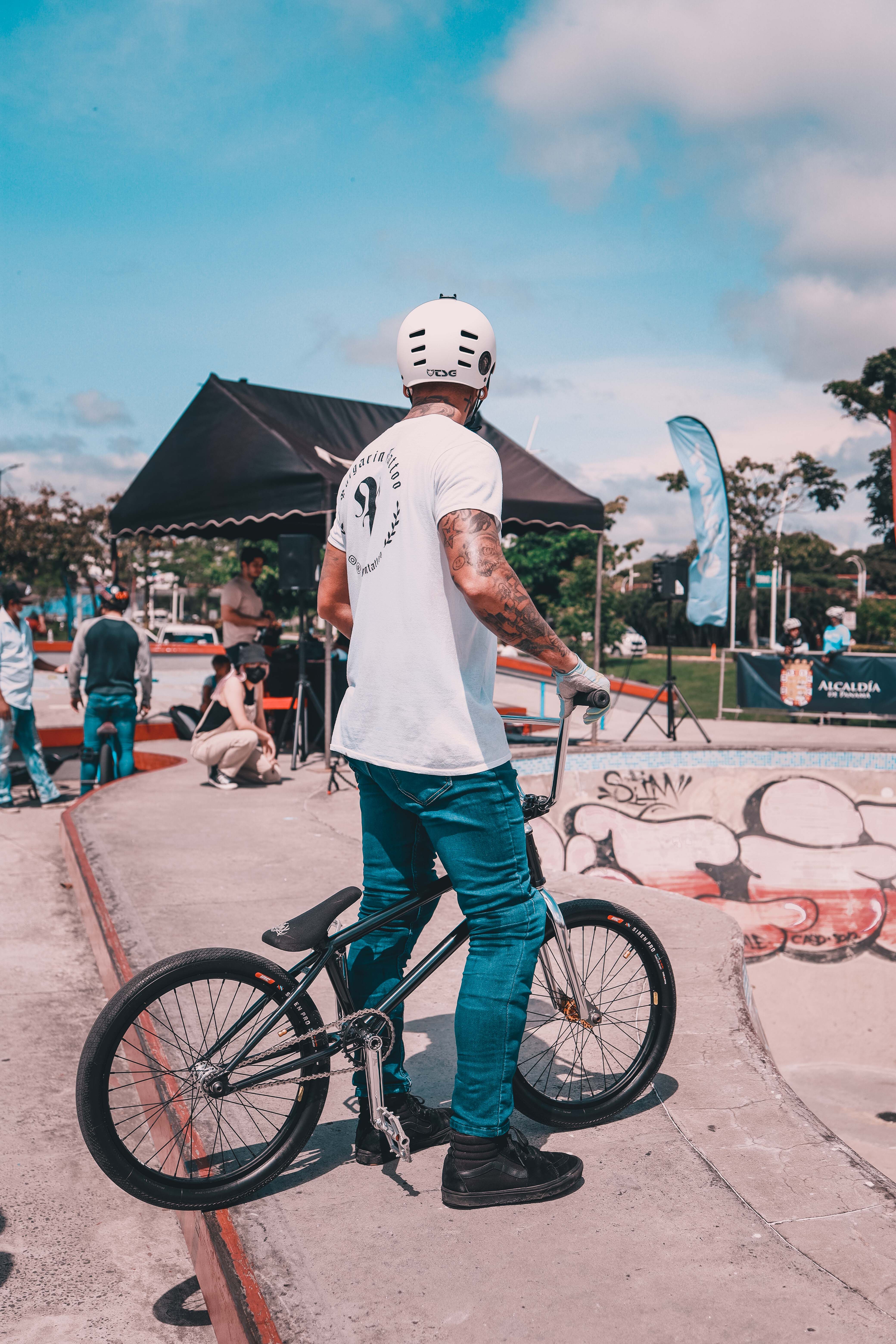 Man Holding BMX Bike · Free Stock Photo