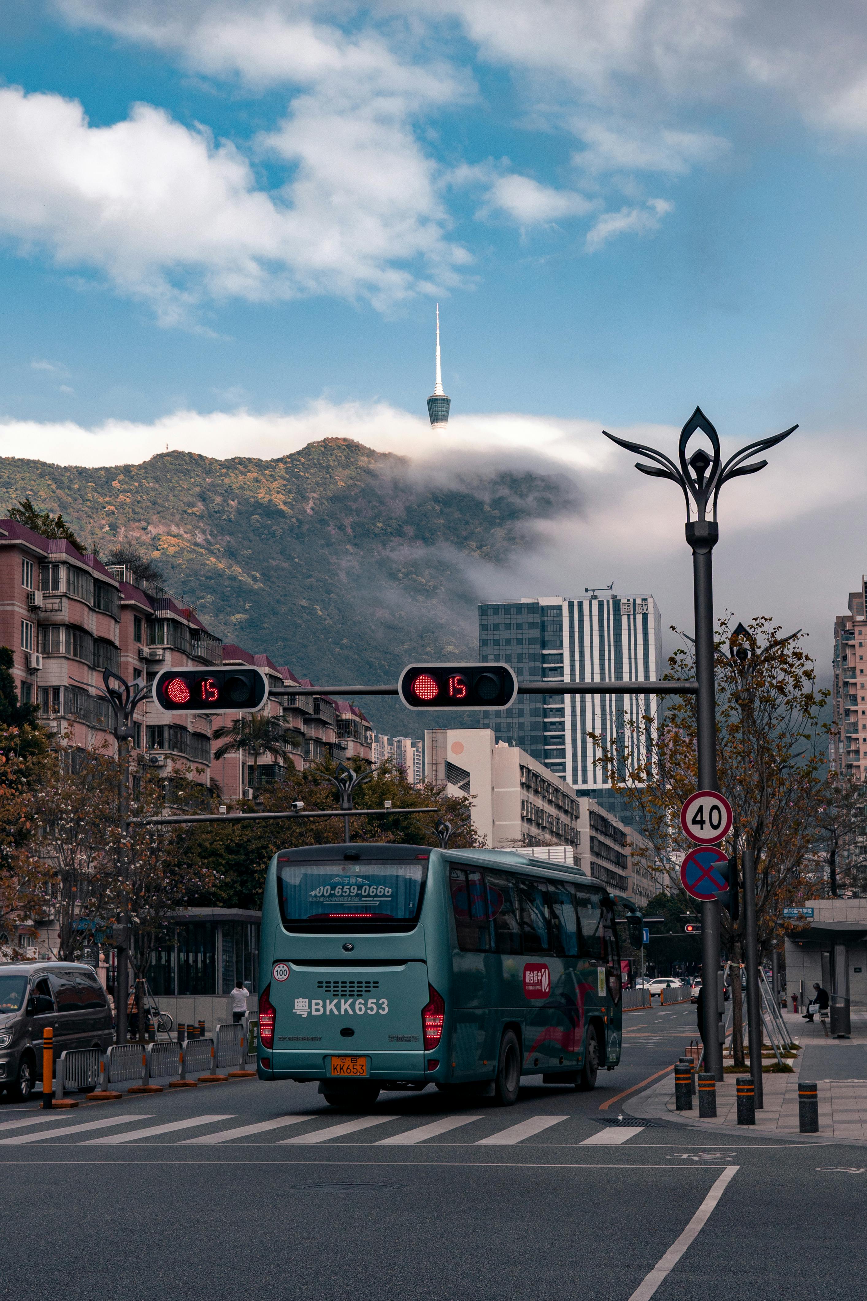 Back View of Bus on Street · Free Stock Photo