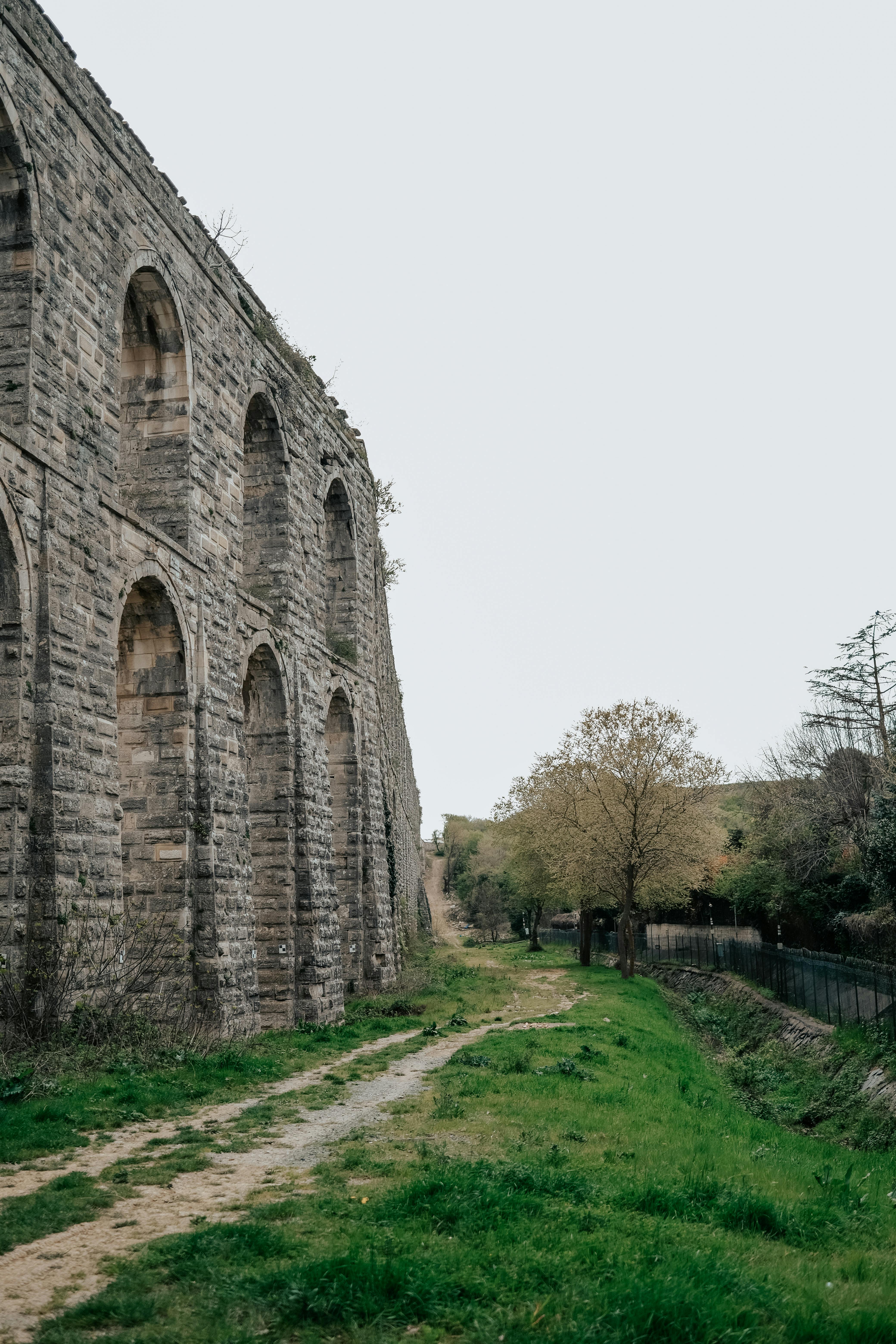 Ancient Stone Aqueduct · Free Stock Photo