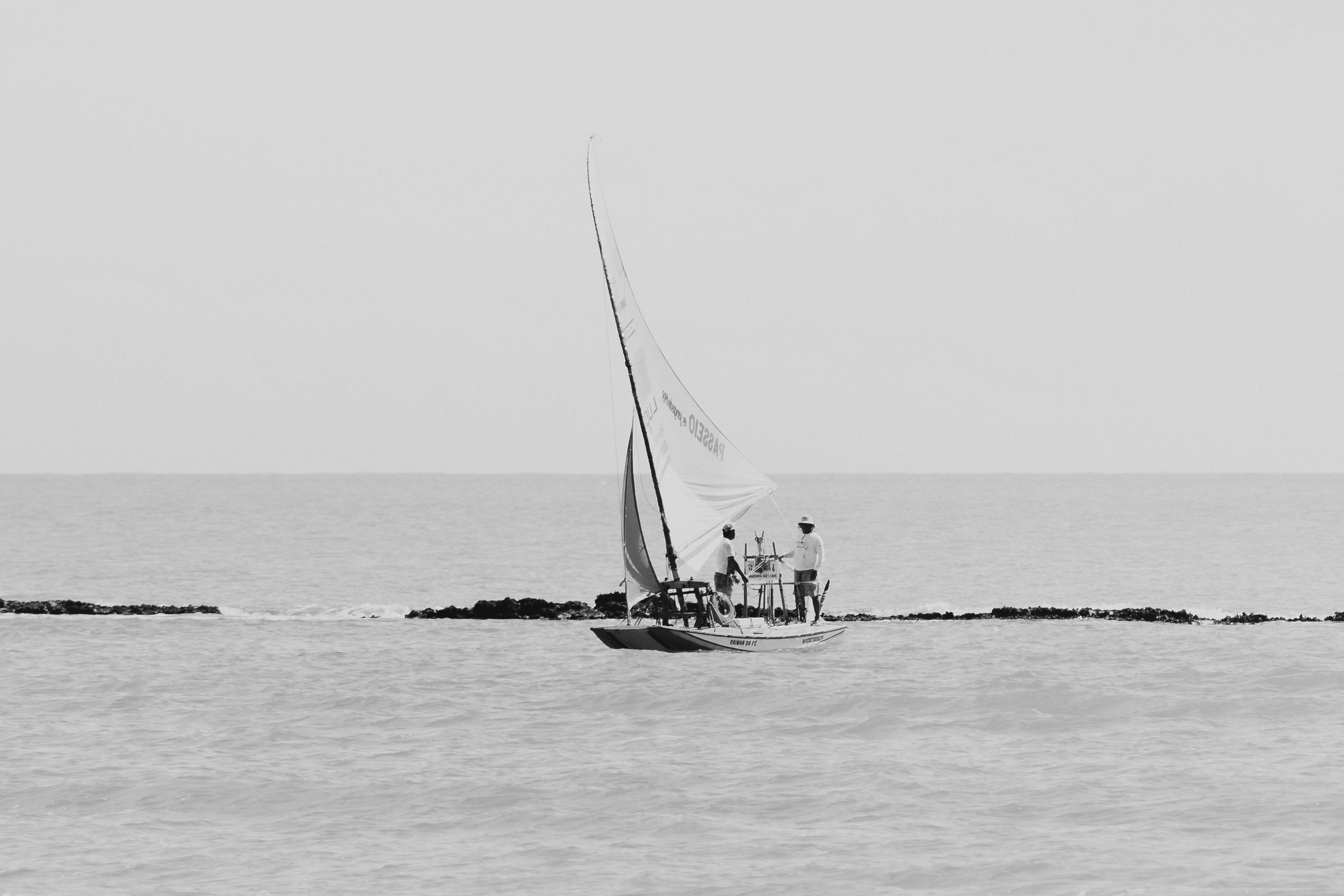Floating Raft with Sail in the Sea · Free Stock Photo