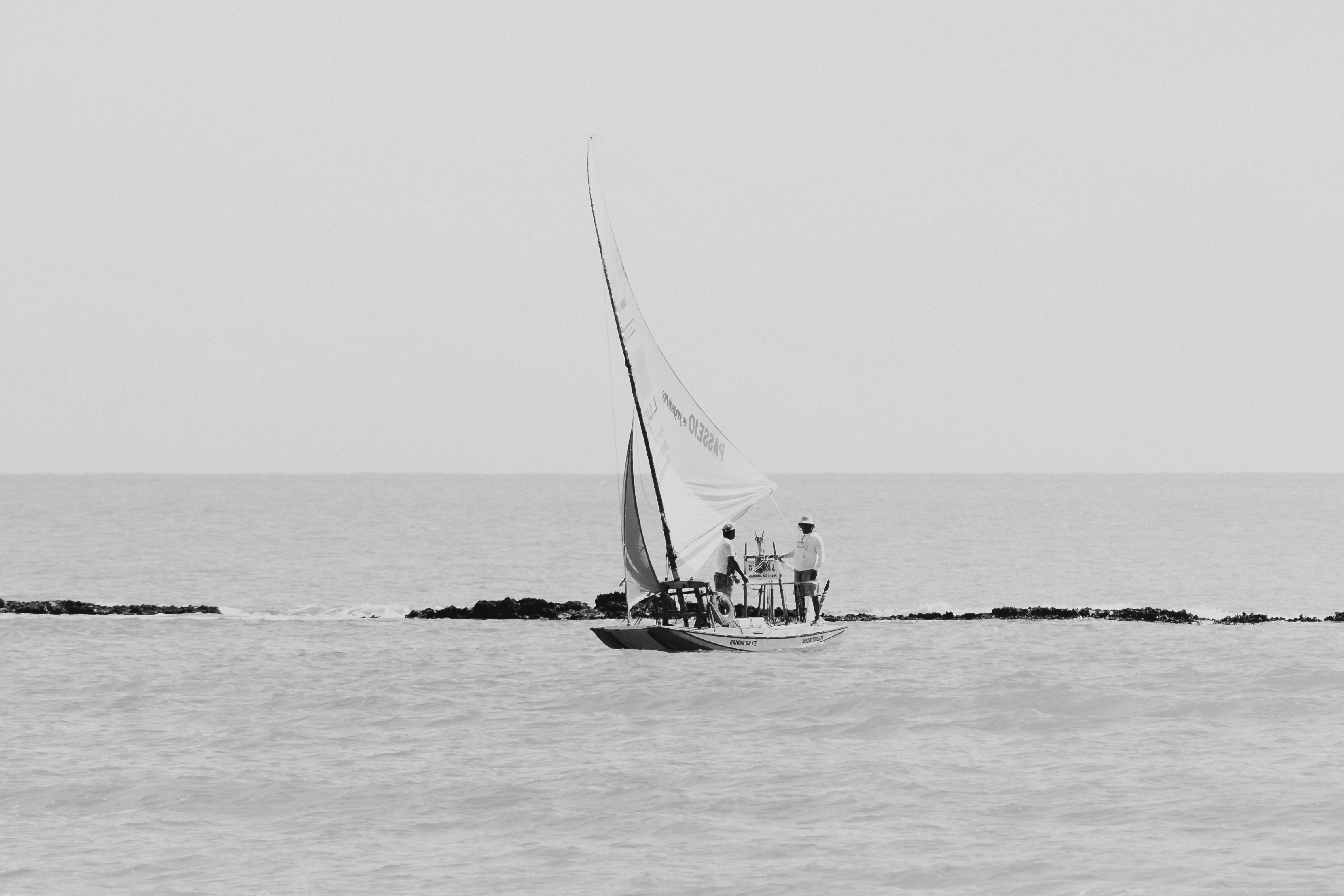 Floating Raft with Sail in the Sea · Free Stock Photo
