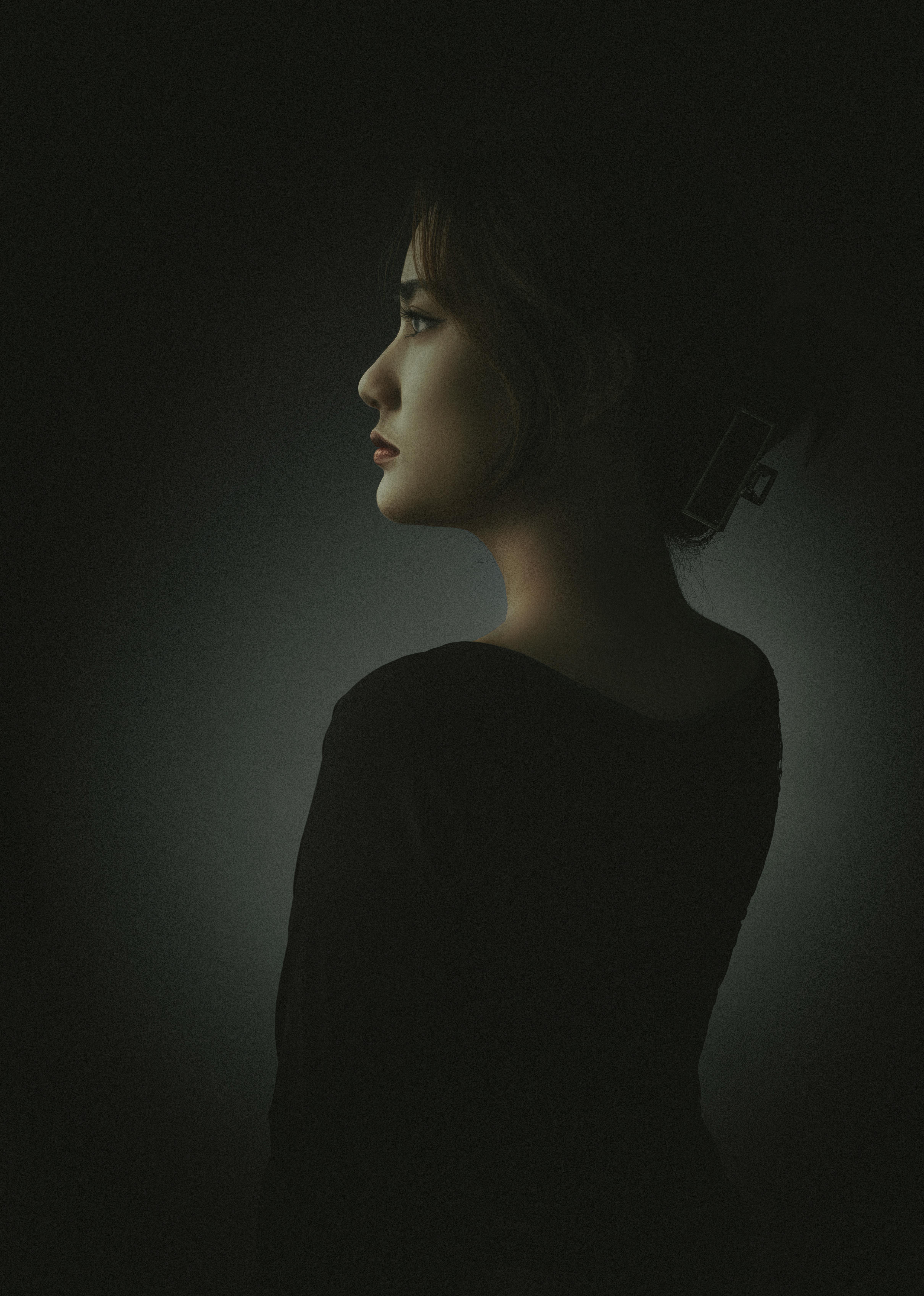 Woman Posing on Black Background · Free Stock Photo