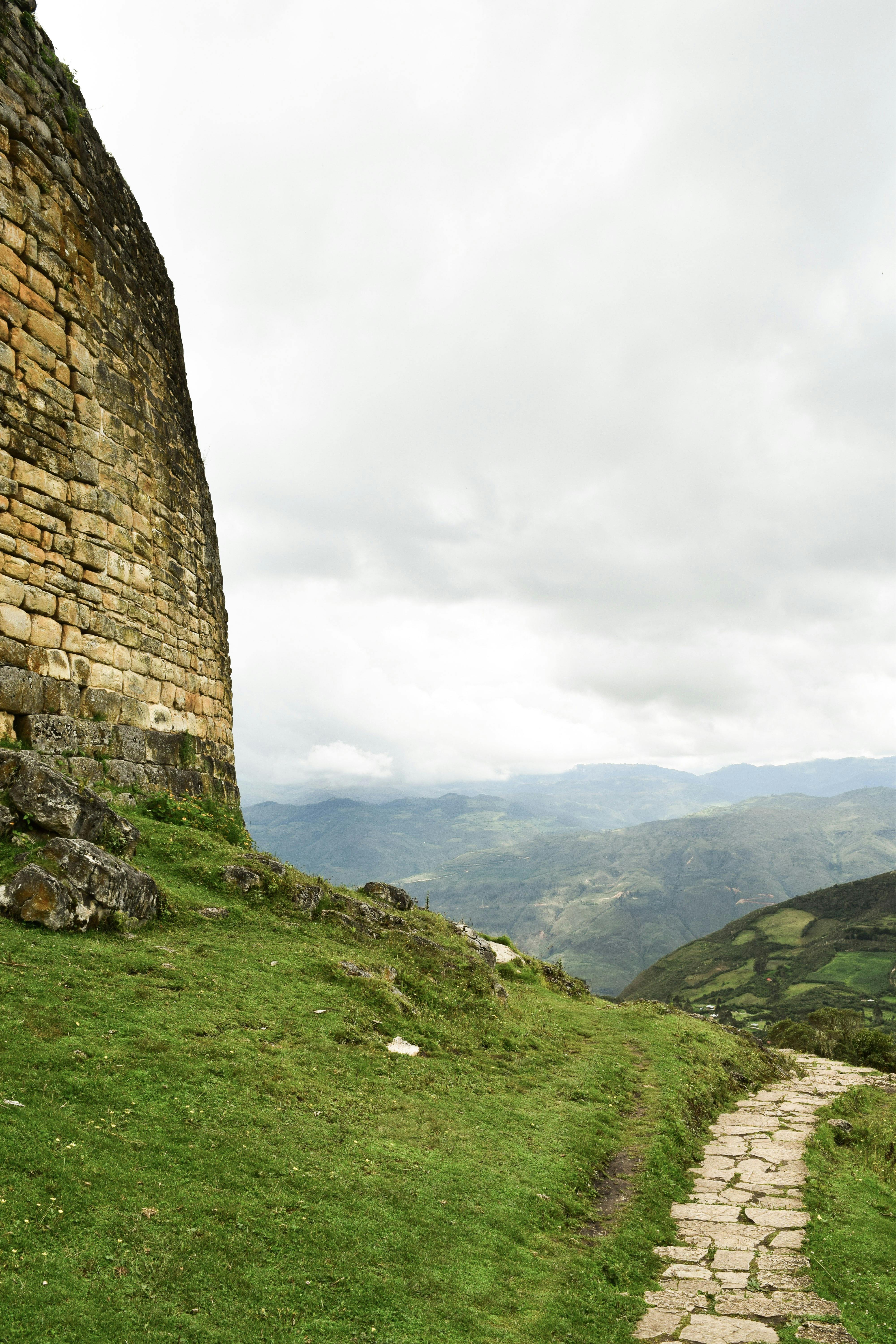 Castle Ruins and a Stone Pathway in the Mountains · Free Stock Photo