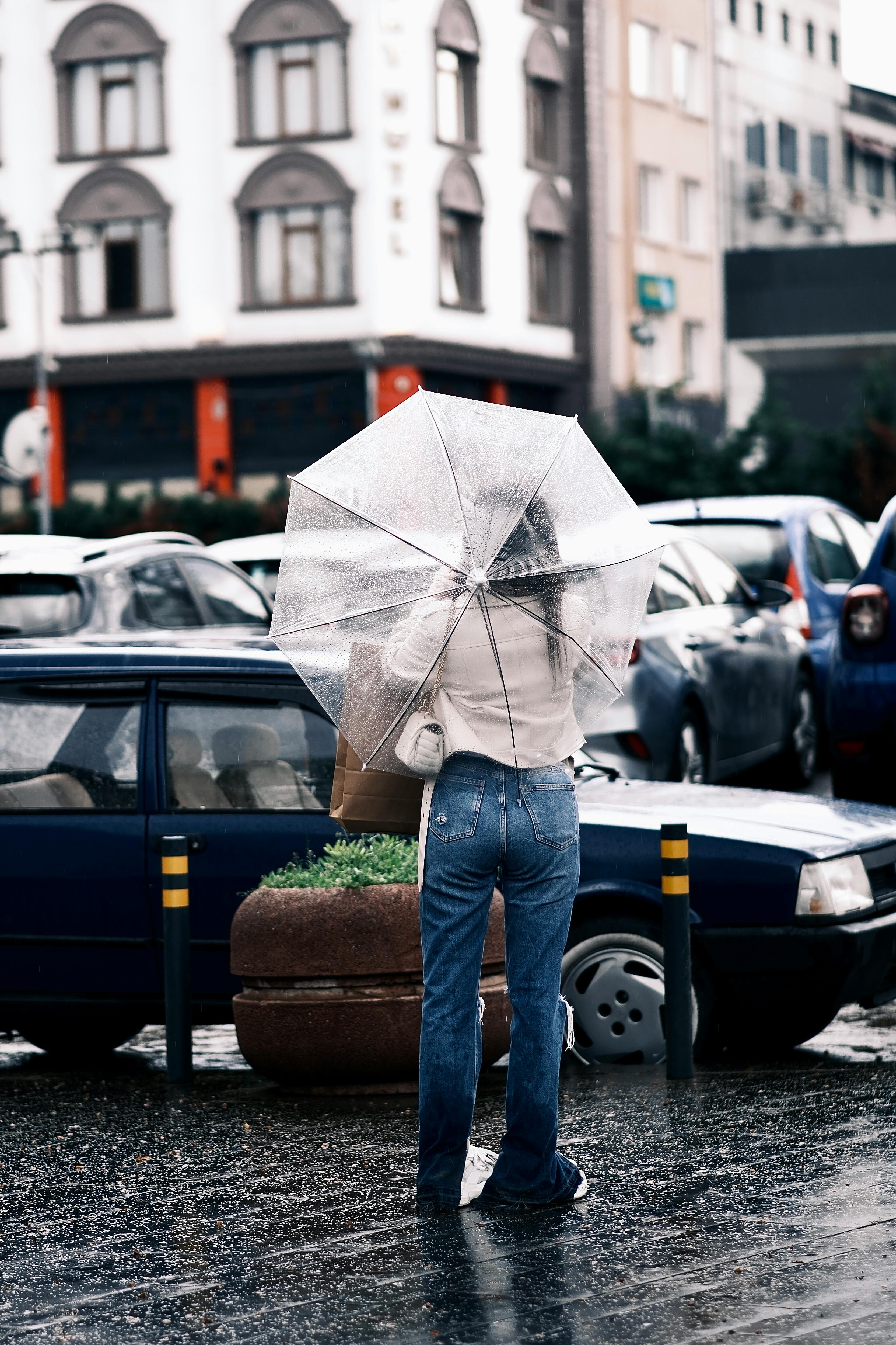 People Walking in Heavy Rain in City · Free Stock Photo