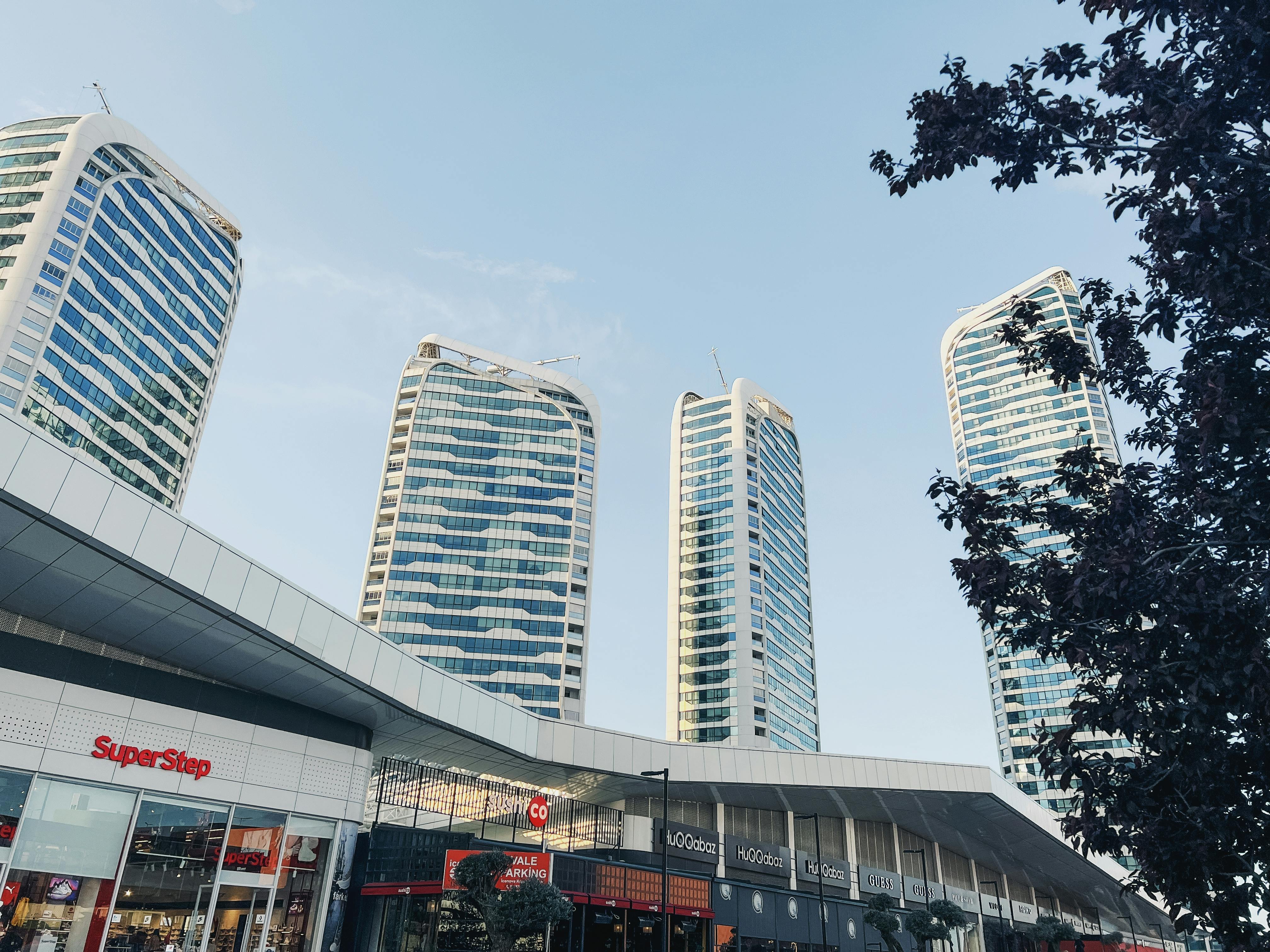 Shopping Mall and Skyscrapers behind · Free Stock Photo