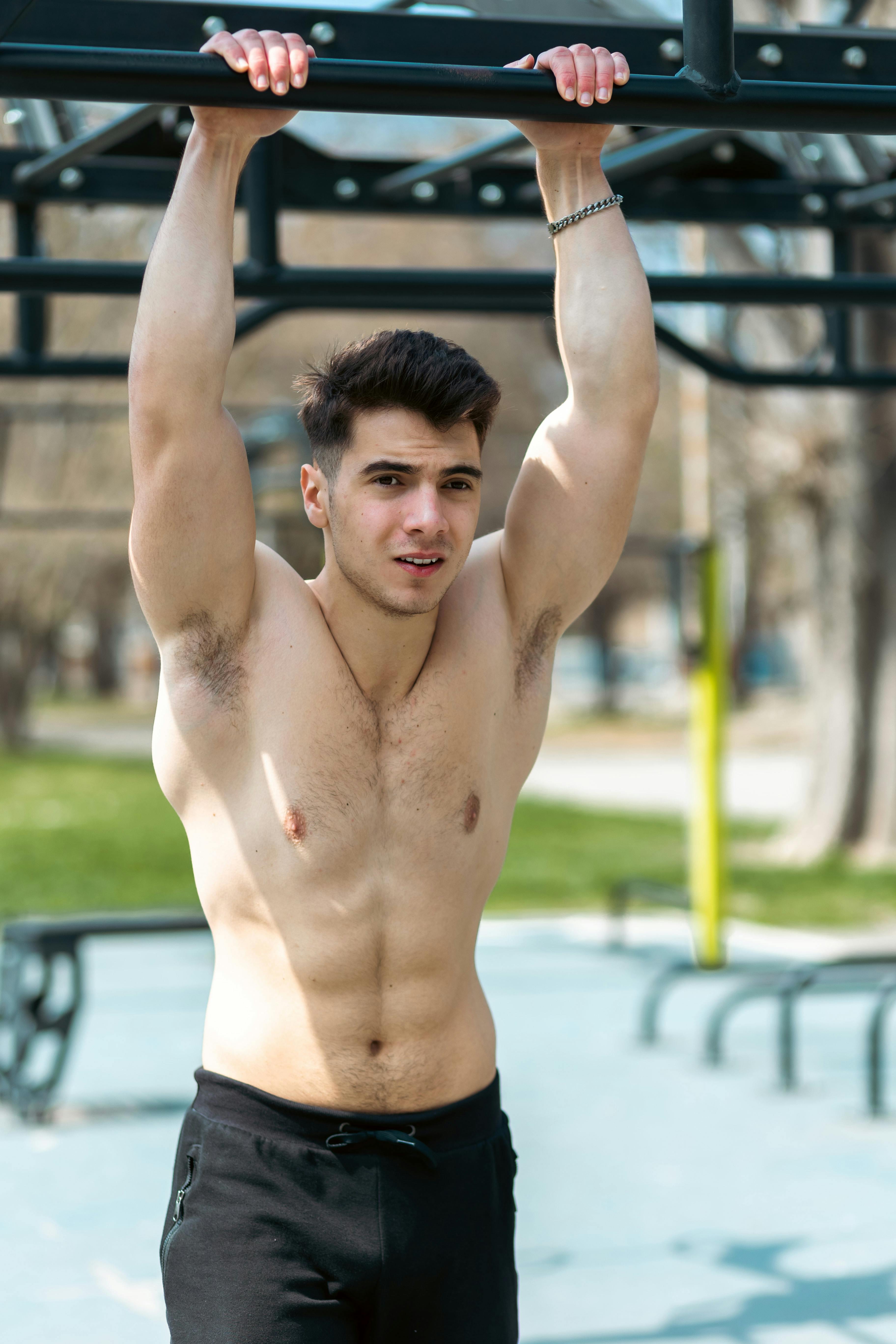 Shirtless Model at Outdoor Gym · Free Stock Photo