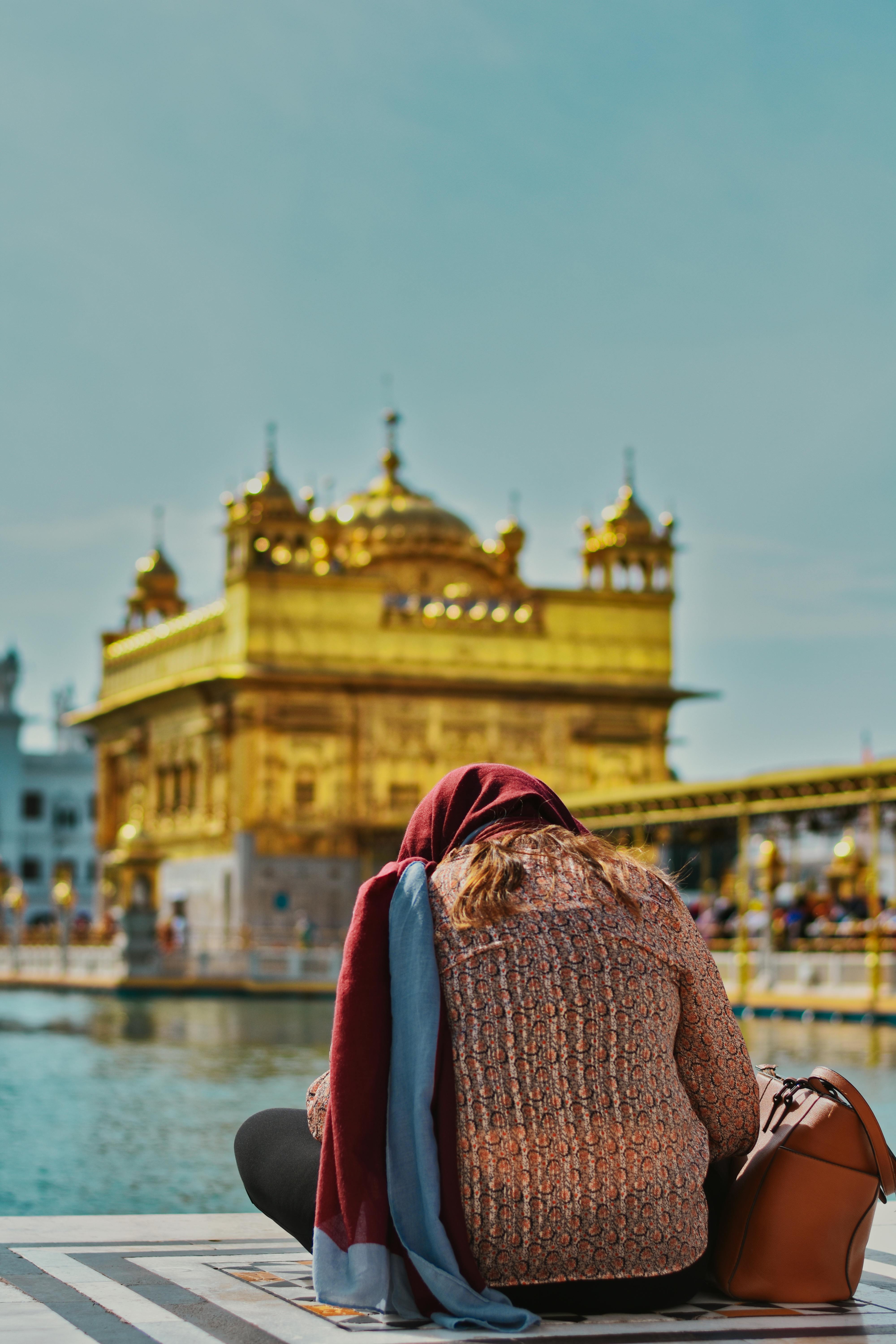 Back View of a Woman Sitting near the Golden Temple, Amritsar, Punjab ...