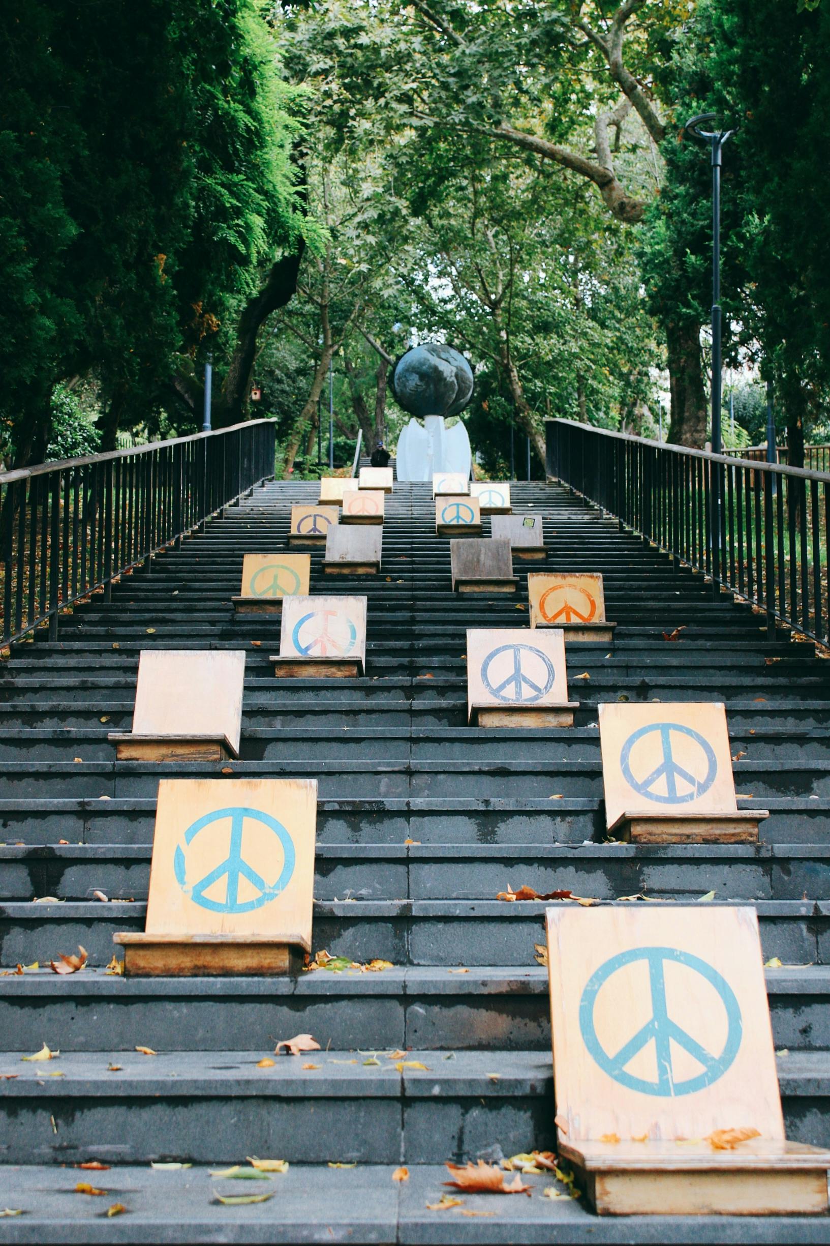 Signs with the Peace Symbol on the Stairs in the World Peace Park ...