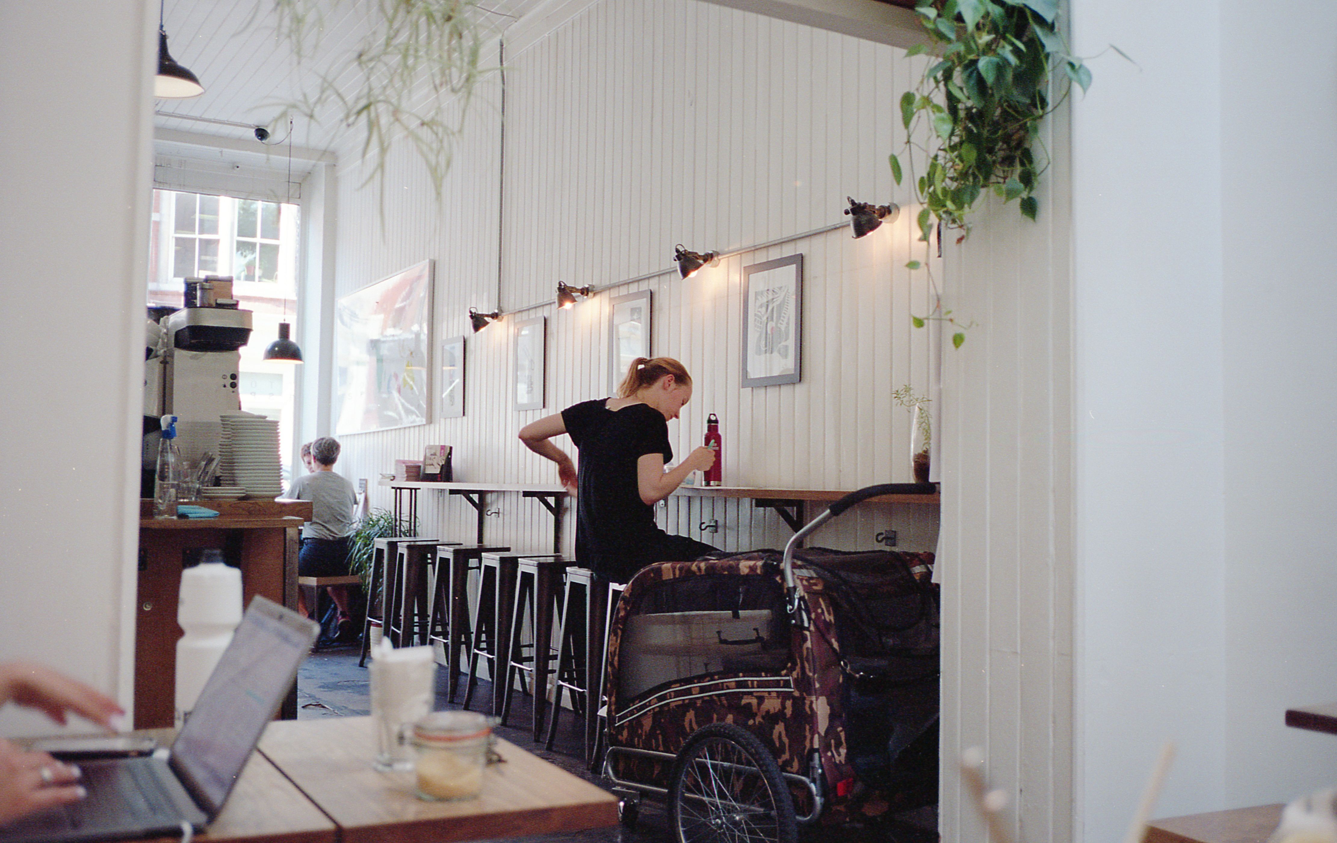 View of People Sitting in a Modern Cafe · Free Stock Photo