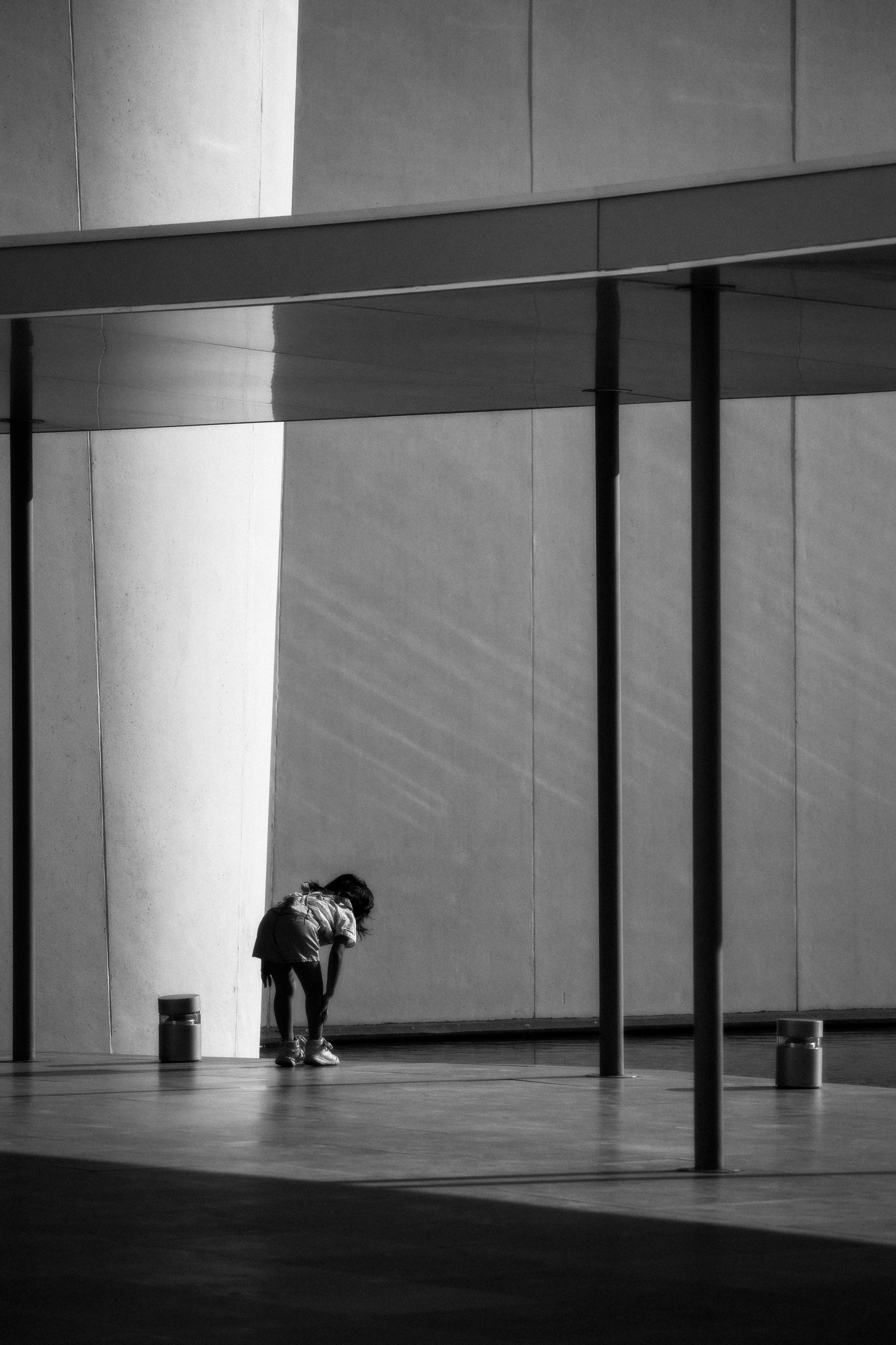 A Person in front of a Modern Building in City · Free Stock Photo