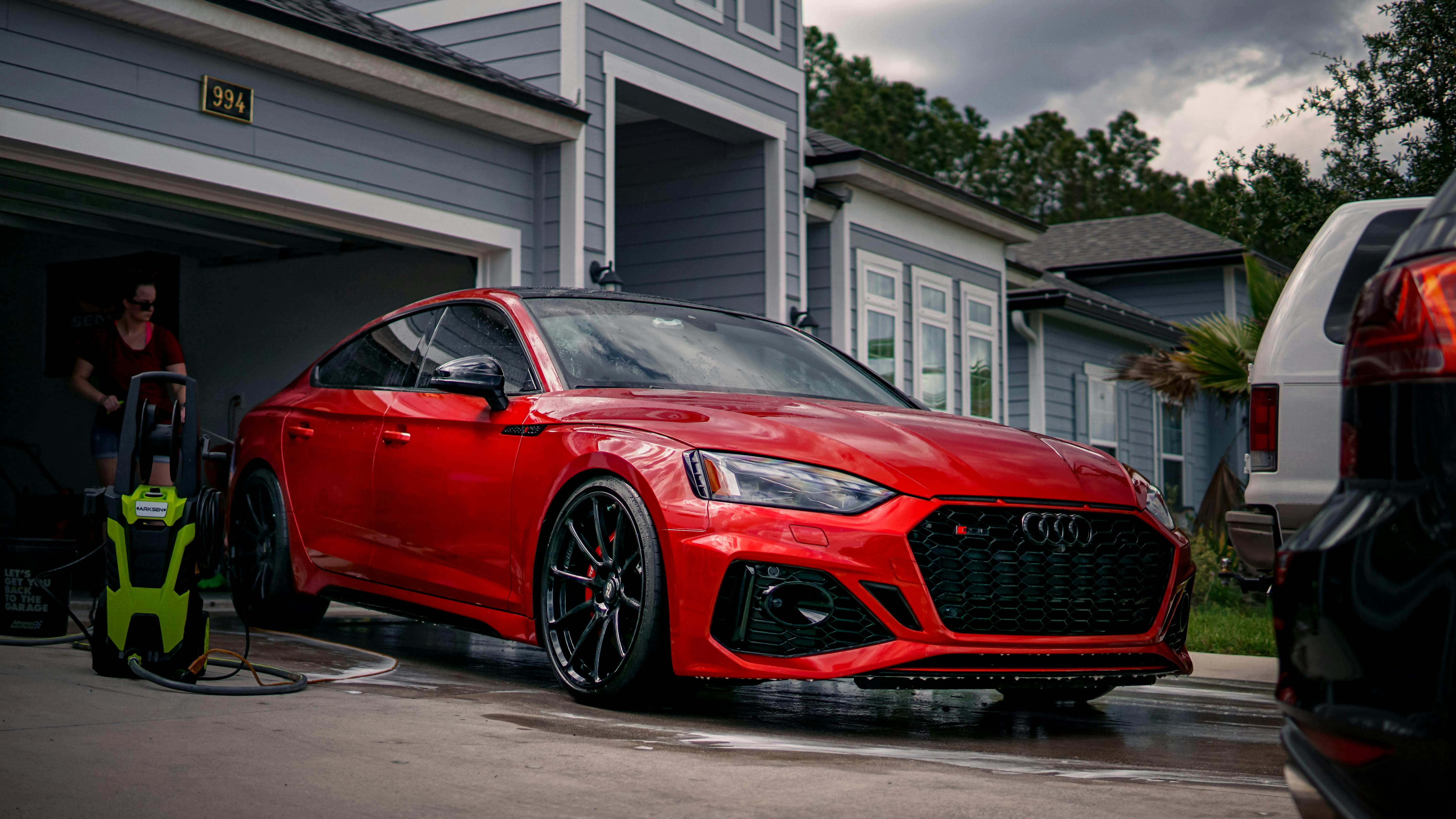 A Red Audi RS5 on a Driveway · Free Stock Photo