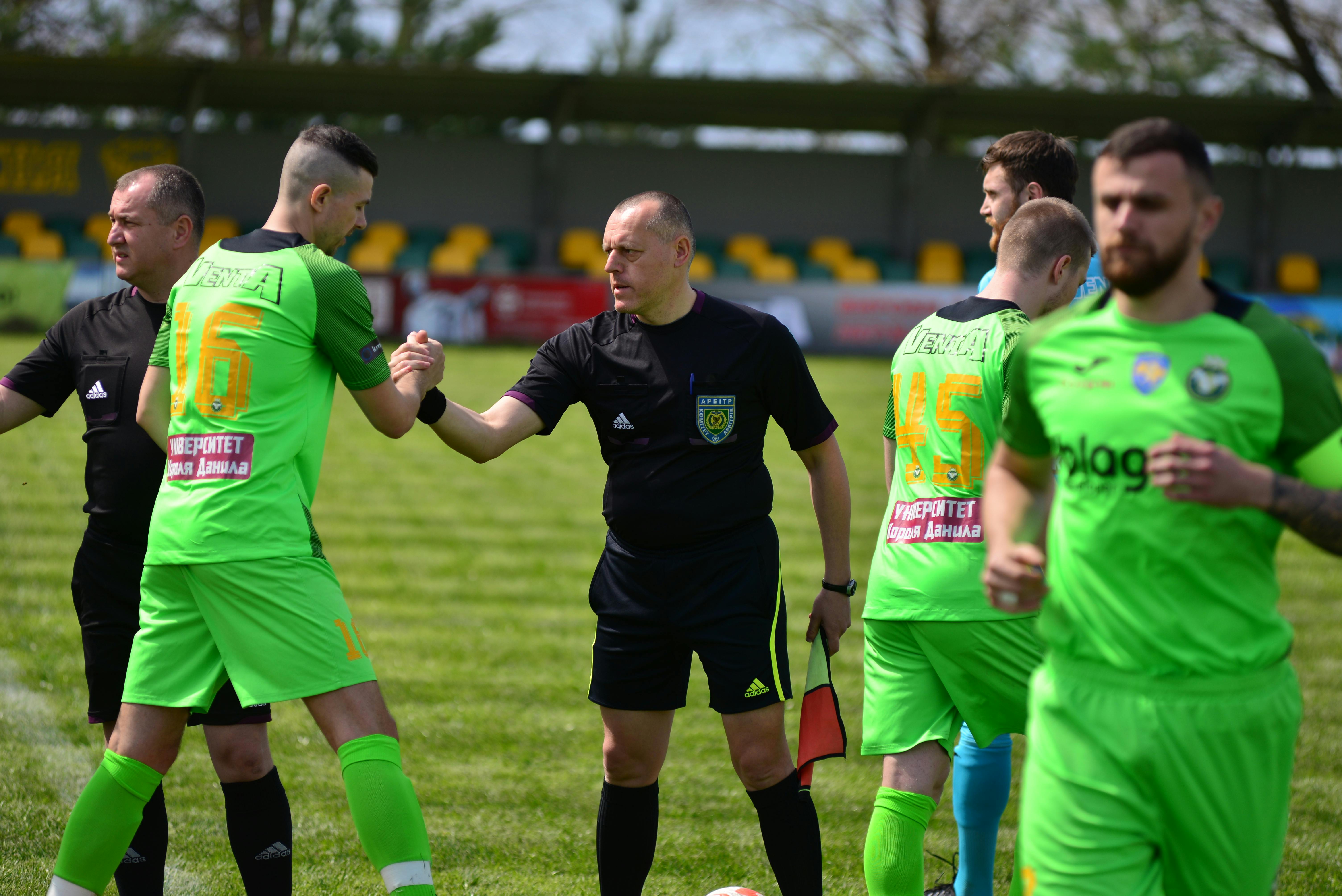 Players and Referees on Football Match · Free Stock Photo