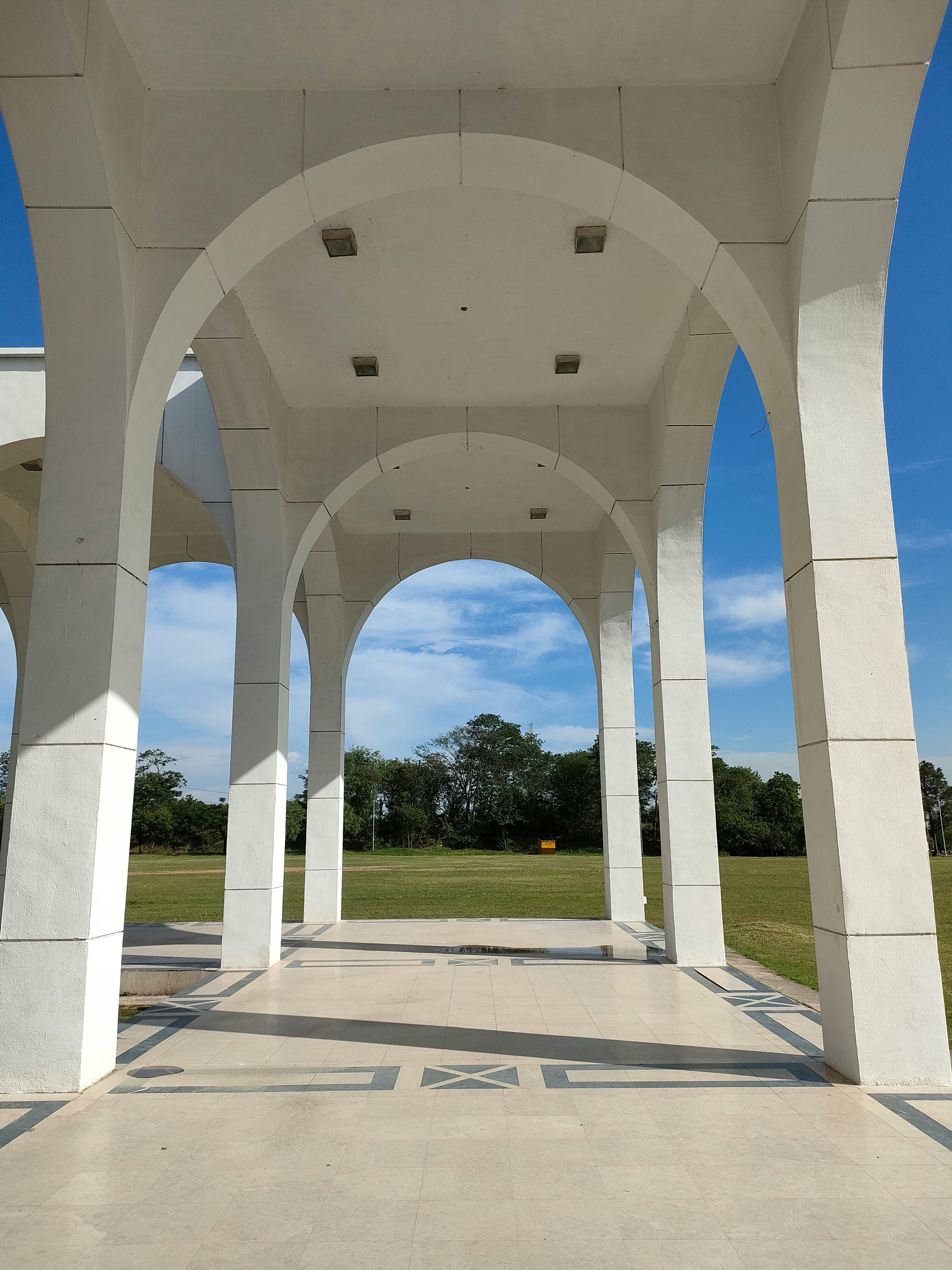Long Arcade with Arched Columns · Free Stock Photo