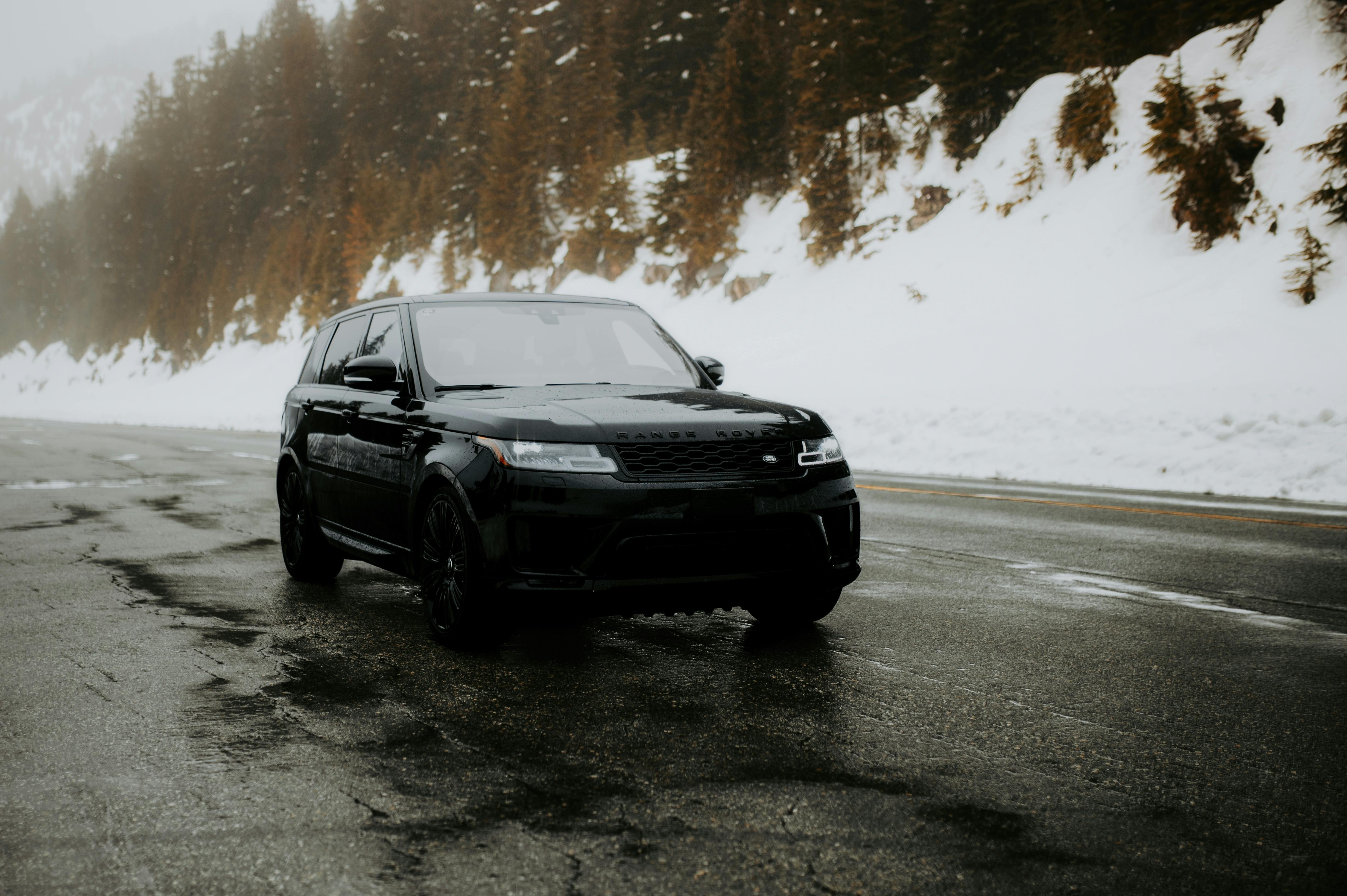 Black Range Rover Sport on Road in Winter · Free Stock Photo