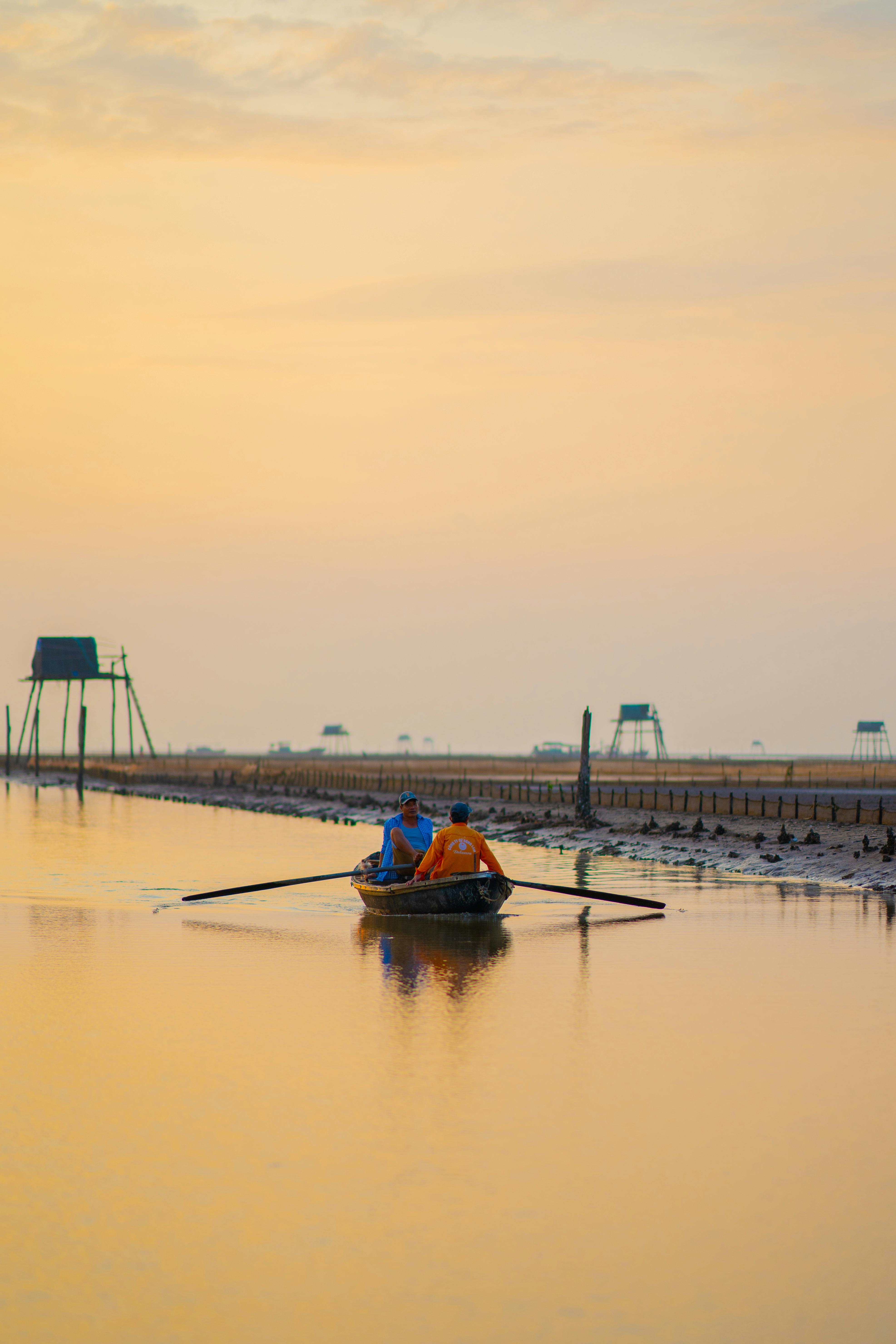Man on Boat with Oars · Free Stock Photo