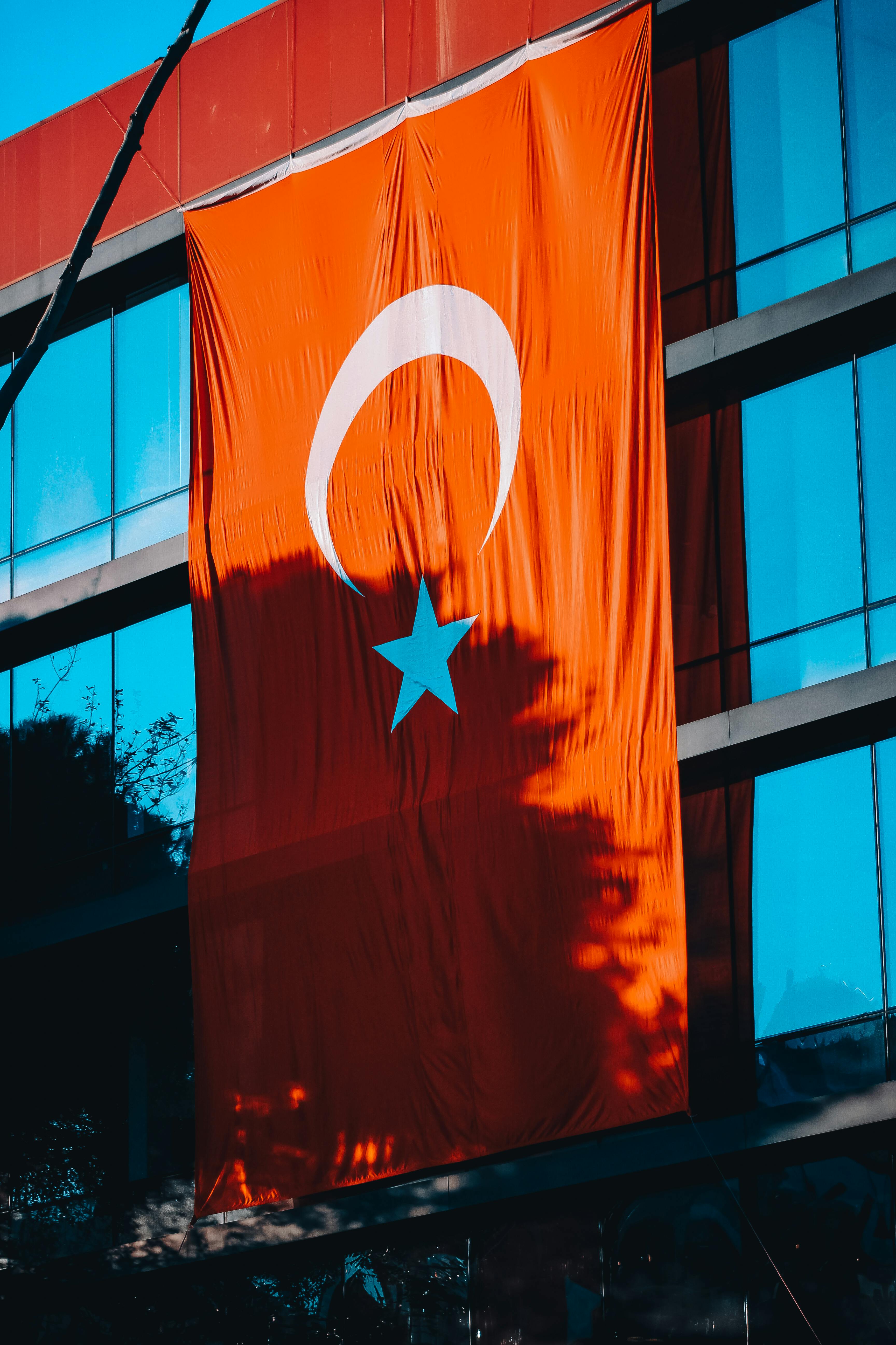 Big Turkish Flag Hanging on the Facade of the Building · Free Stock Photo