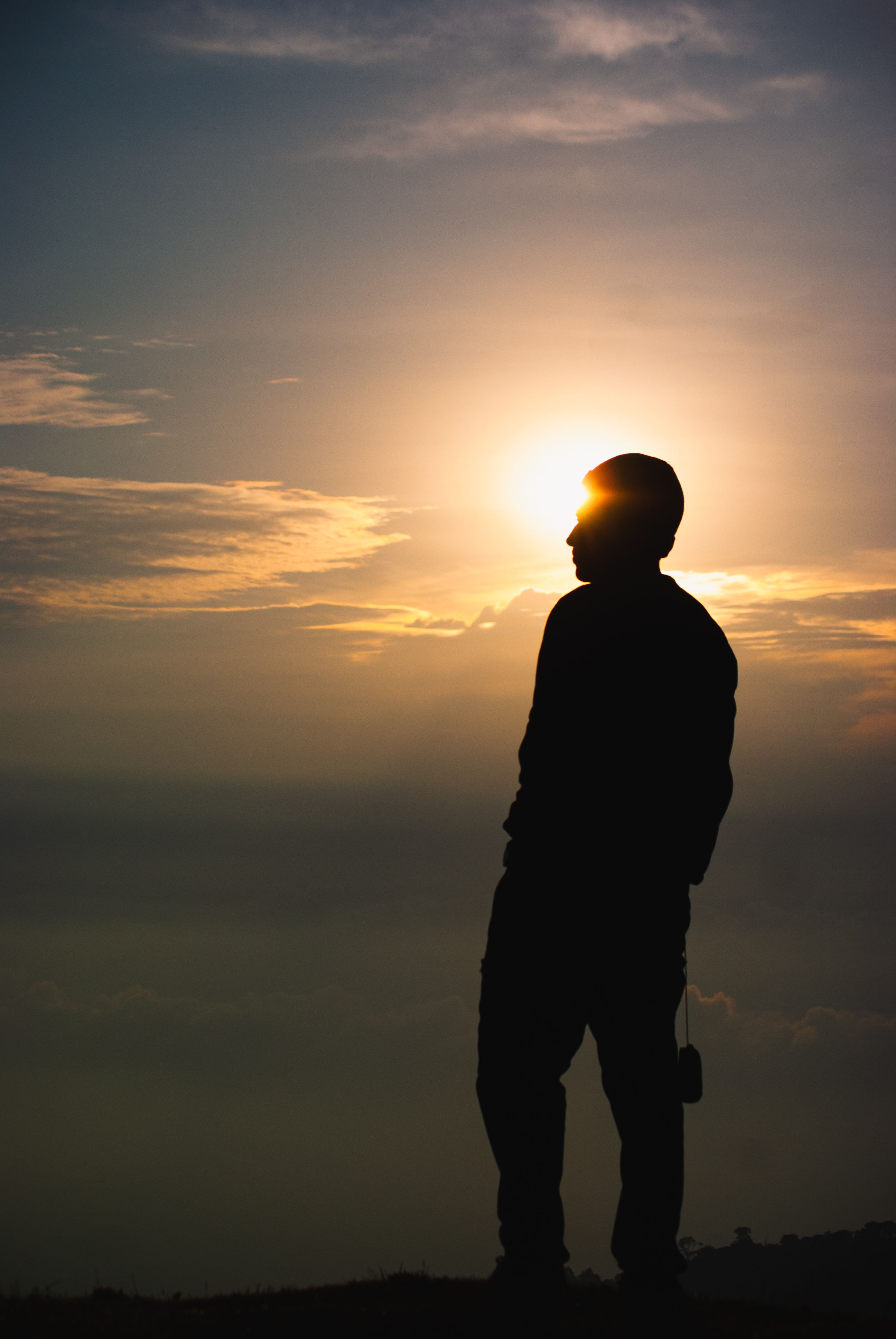 A Silhouette of a Man in Sunset · Free Stock Photo