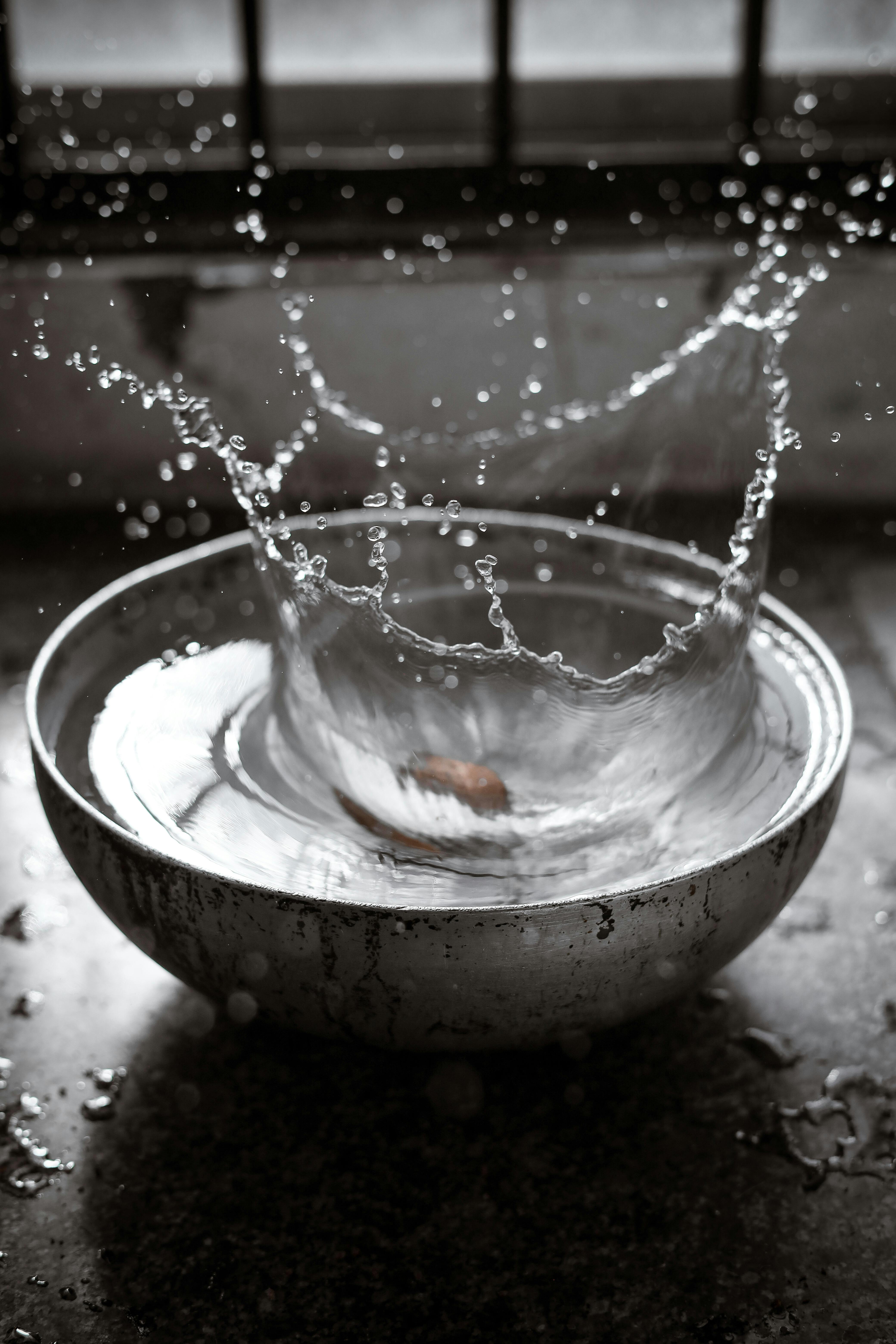 Water Splashing in a Steel Bowl · Free Stock Photo
