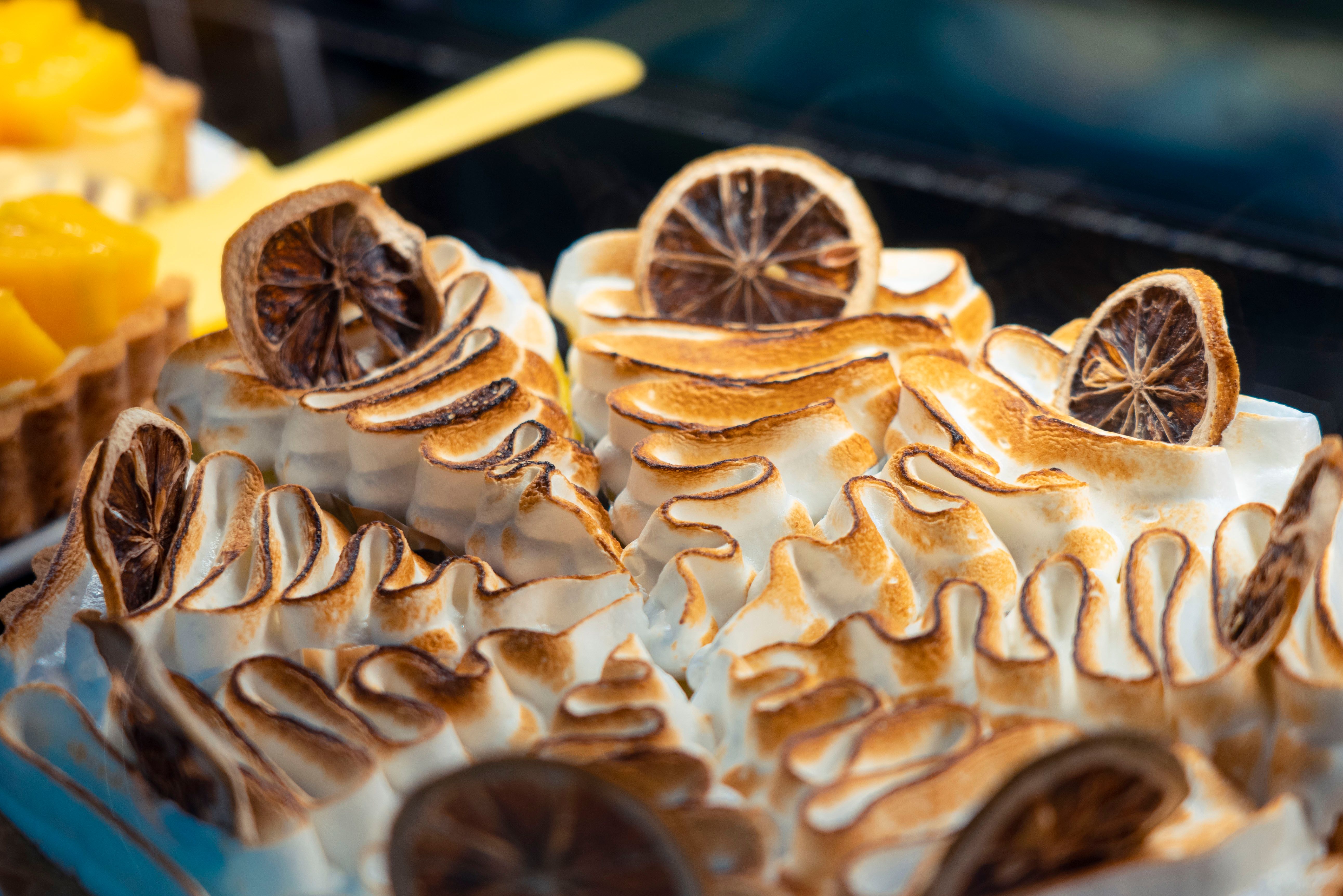 Icing on a Cake Decorated with Lemon Slices · Free Stock Photo