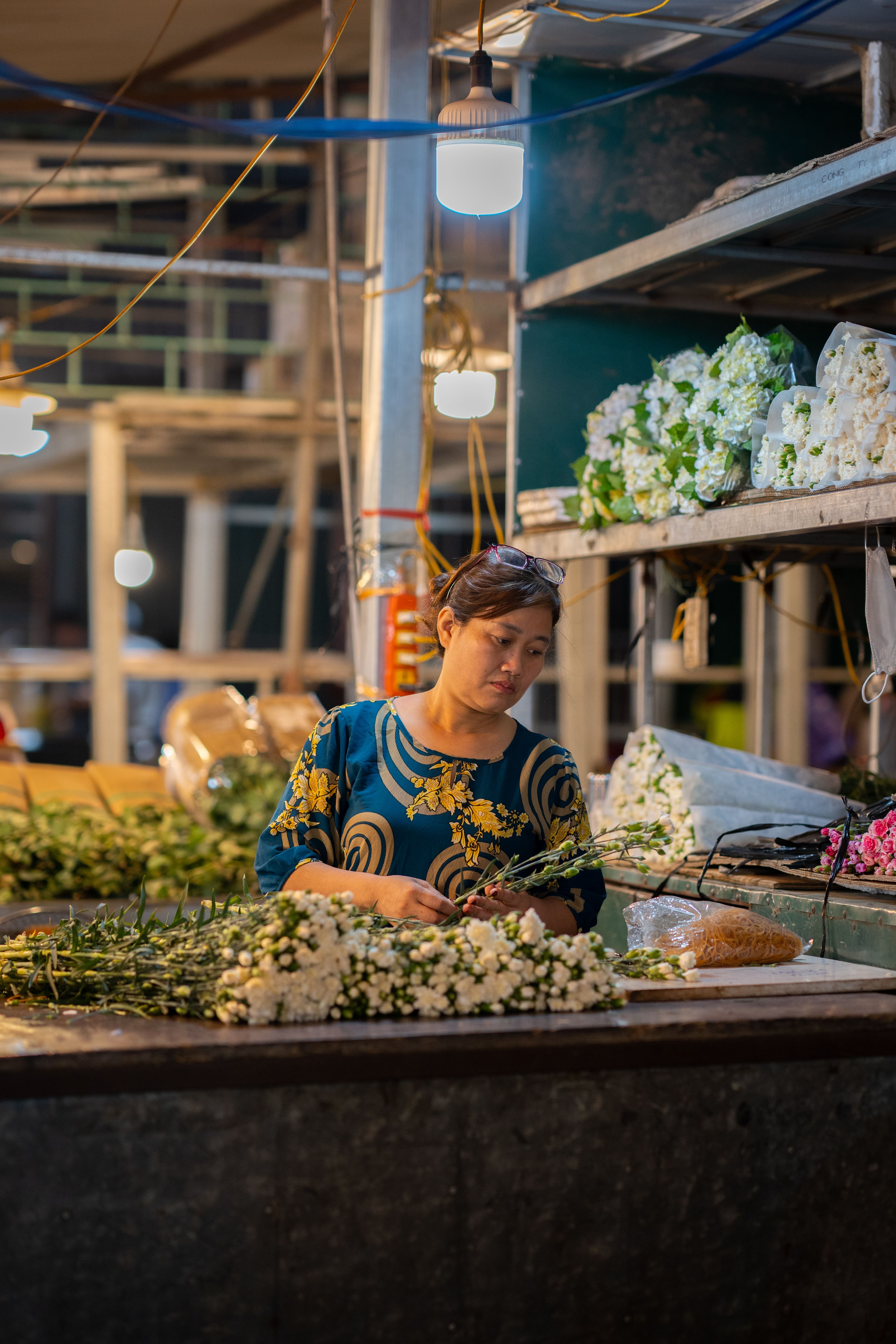 Florist Working with Flowers · Free Stock Photo