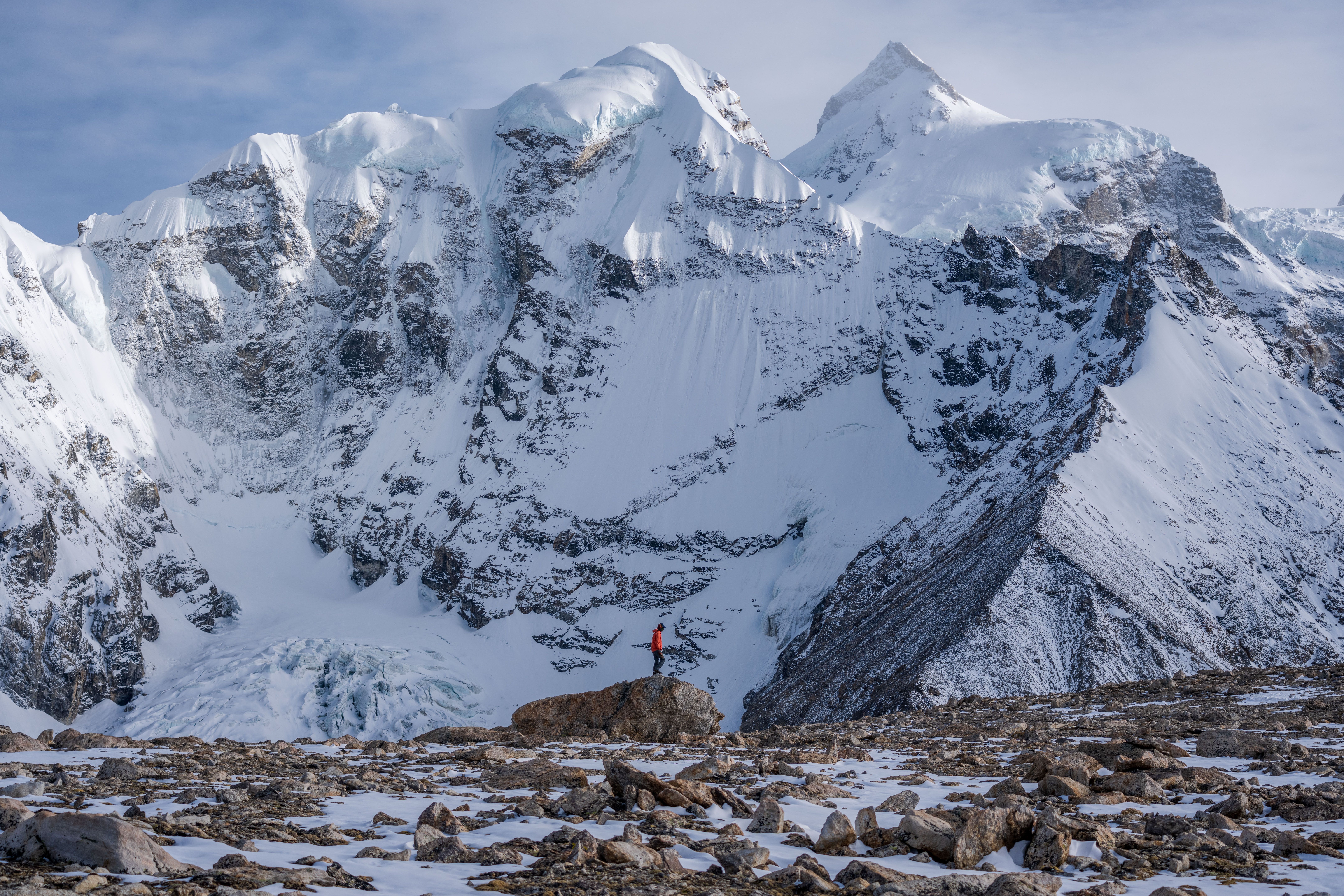 Lone Person Hiking in a Snowcapped Glacier · Free Stock Photo