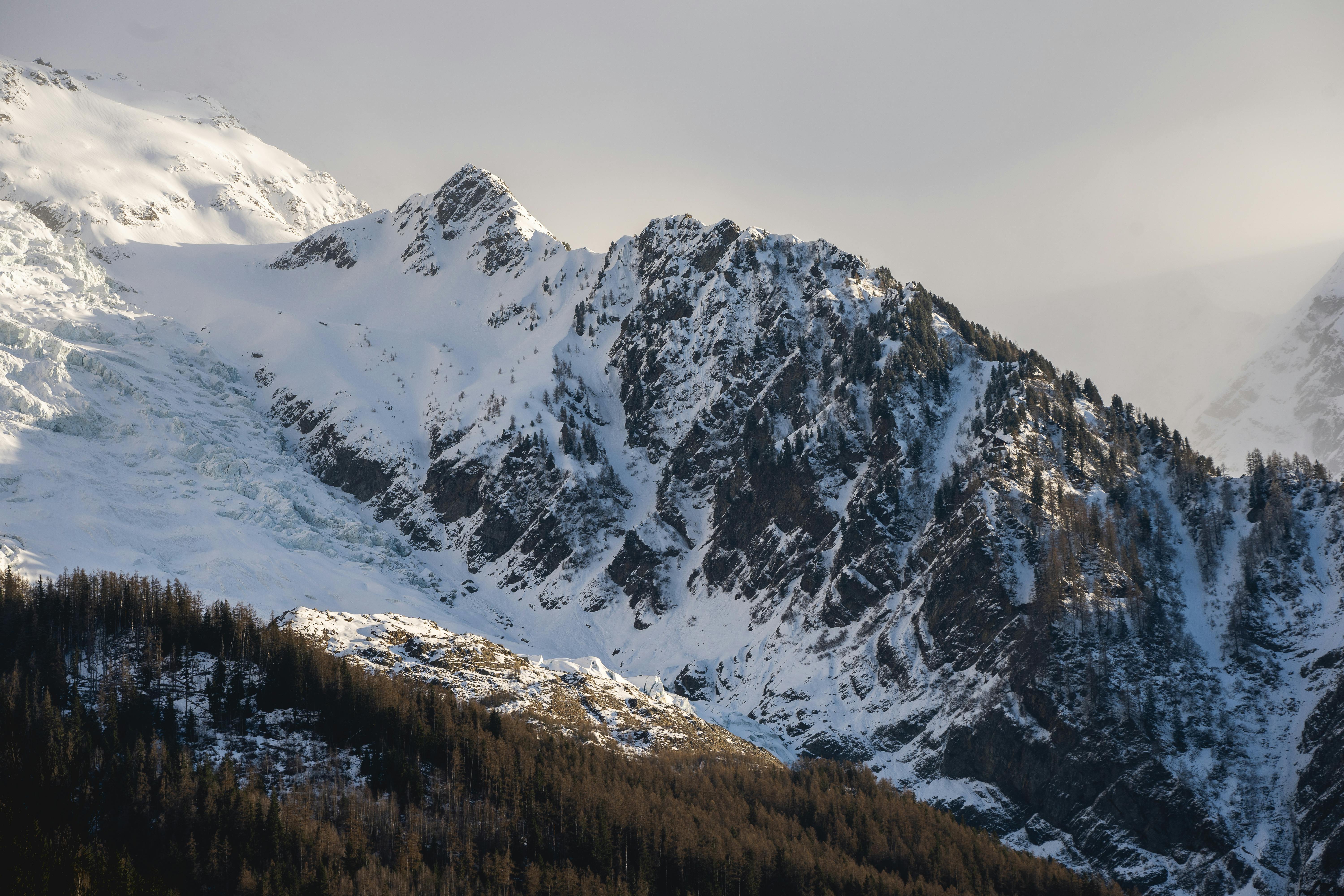Shadow Cast on Snow Covered Mountain · Free Stock Photo