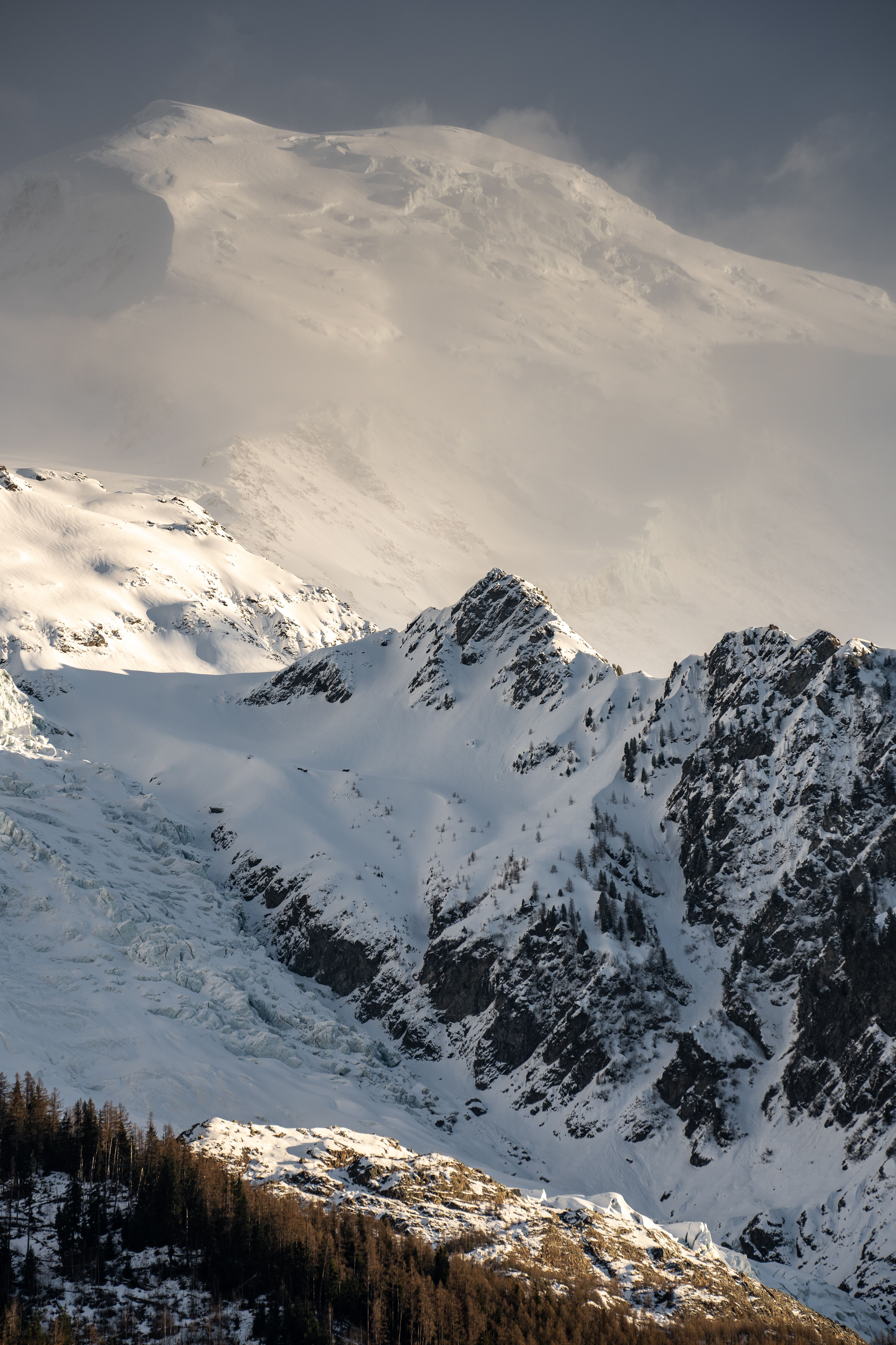 Shadow Cast on Snow Covered Mountain Range · Free Stock Photo