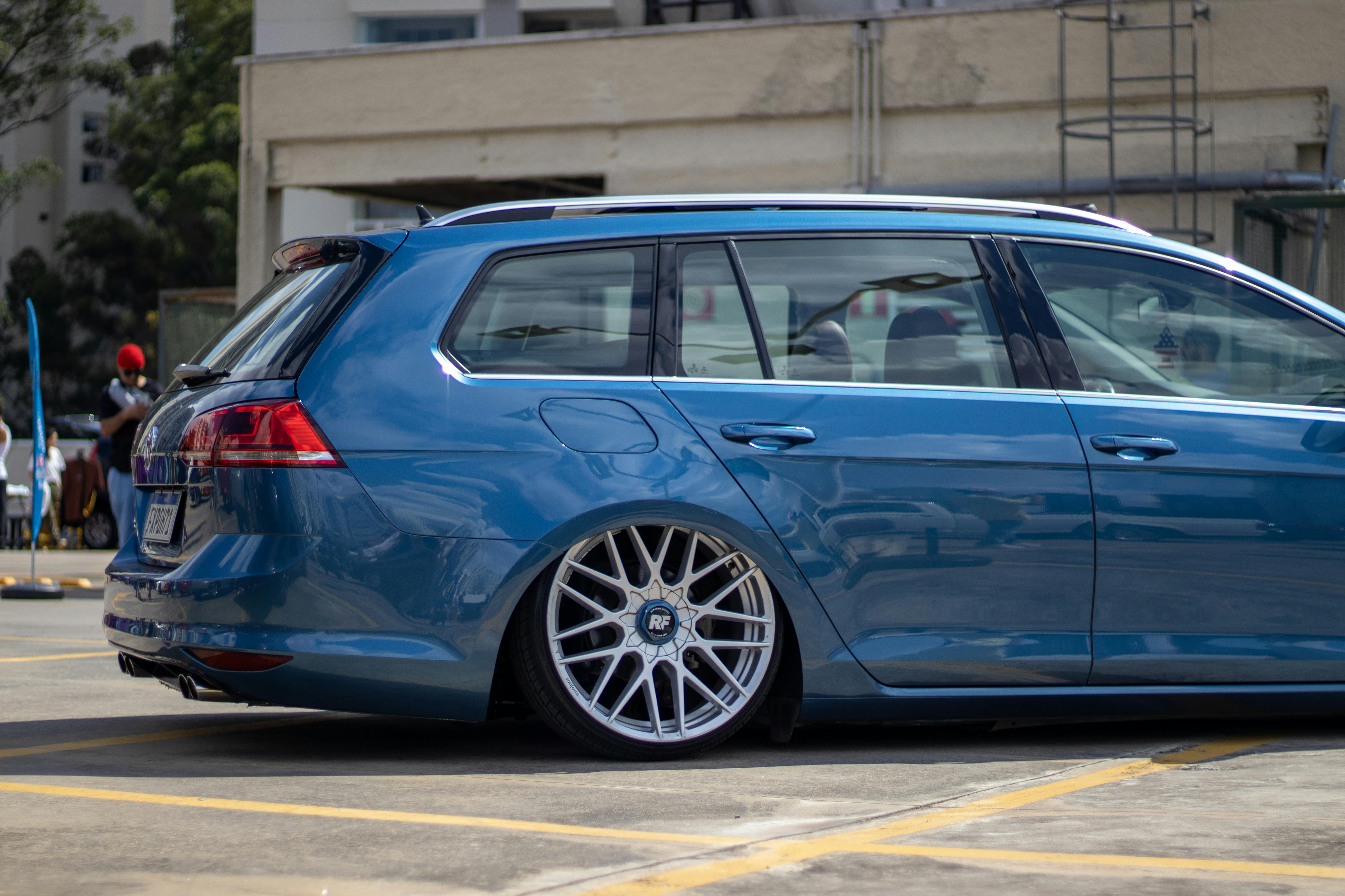 Blue Volkswagen Golf Variant in Parking Lot · Free Stock Photo