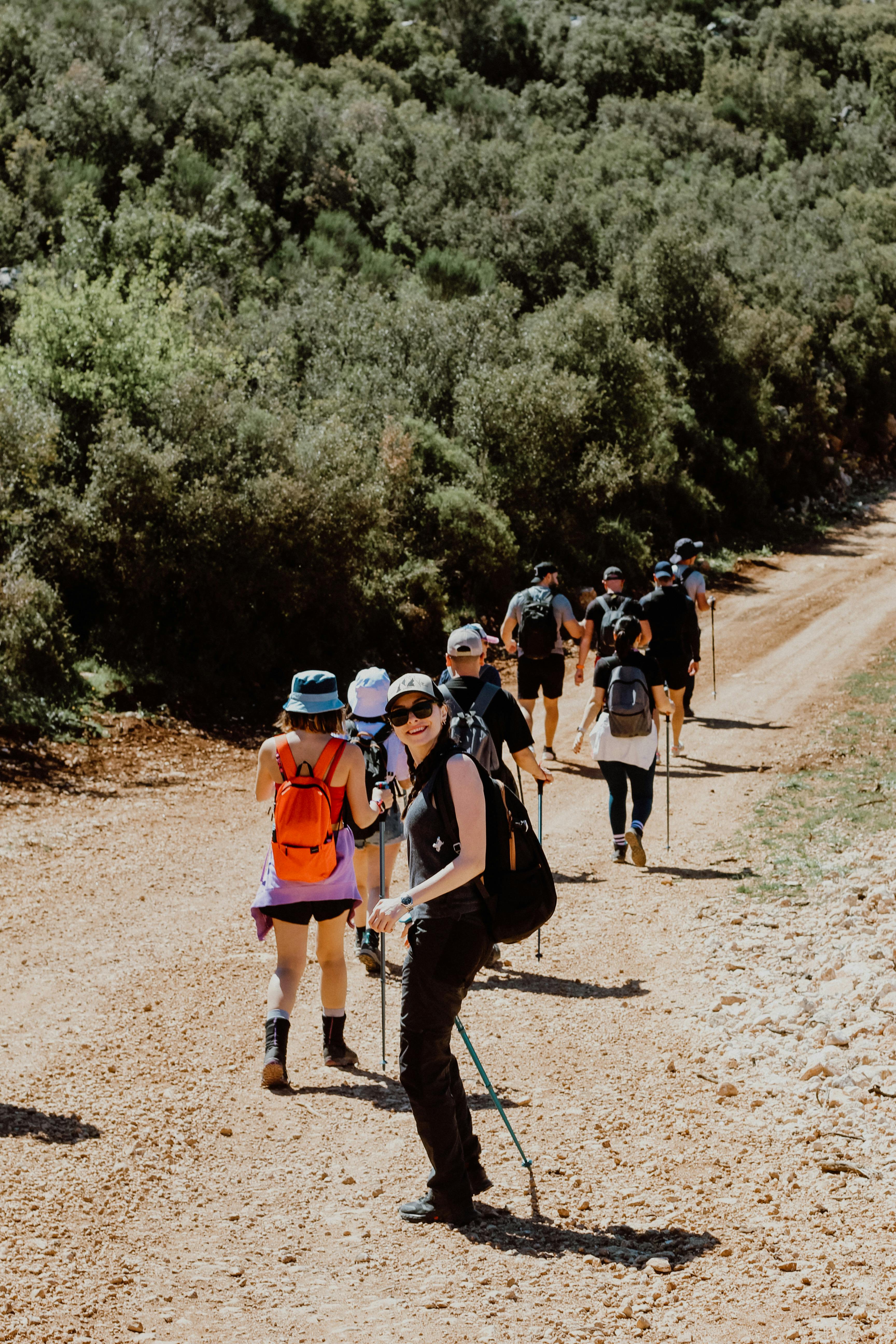 Group of Hikers on a Trail · Free Stock Photo