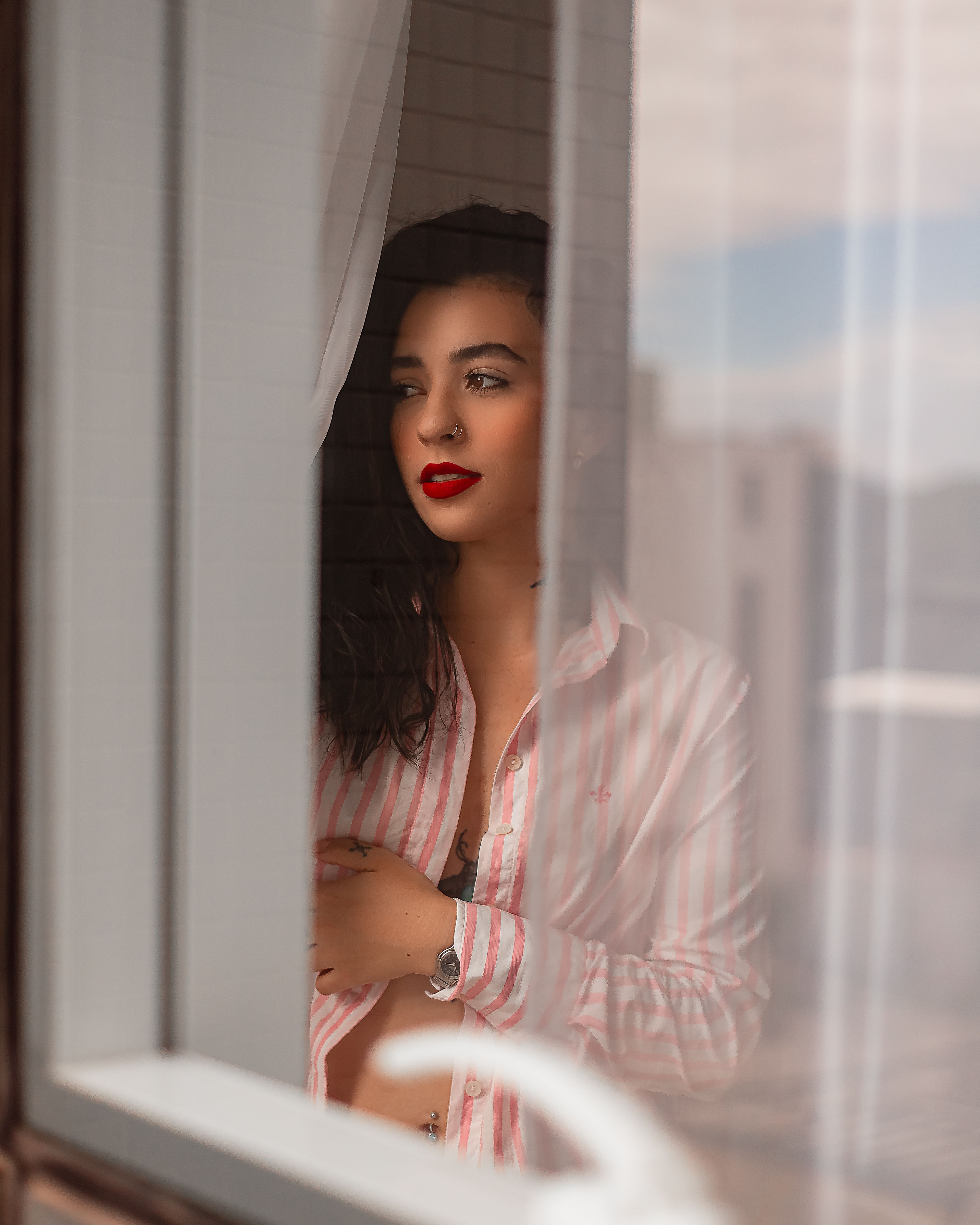 Portrait of Woman with Hands on Lips and Reflection in Mirror · Free ...