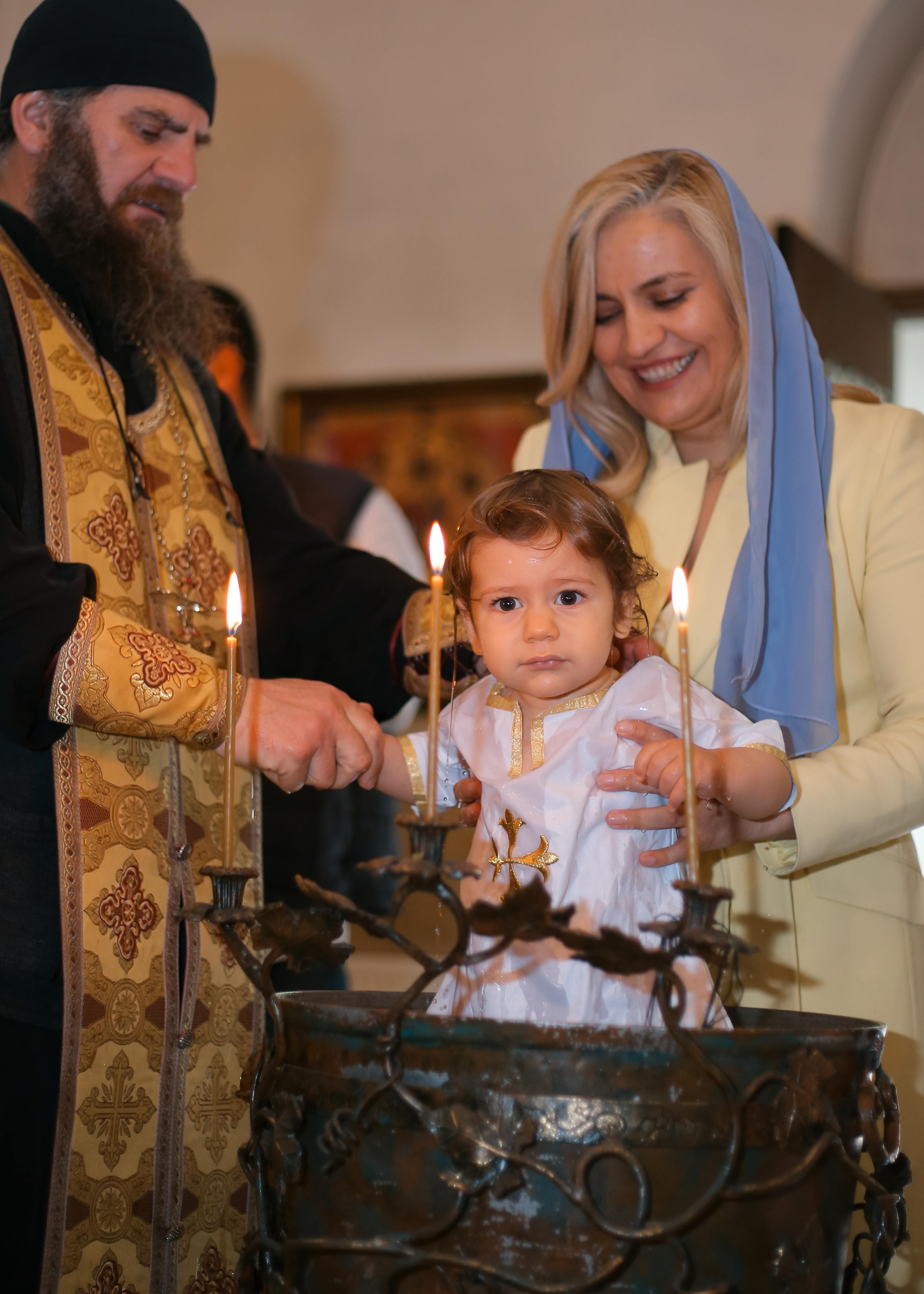 Woman and Priest with Baby on Orthodox Baptism Ceremony · Free Stock Photo