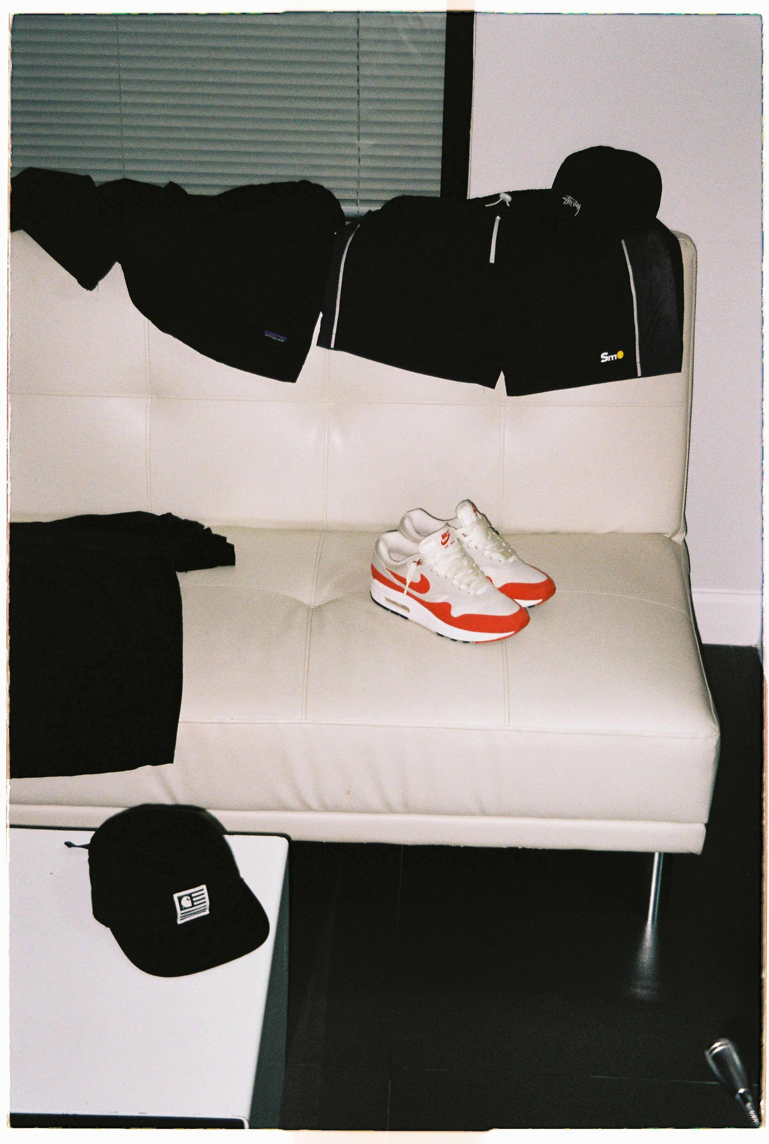 Nike Trainers on Sofa · Free Stock Photo