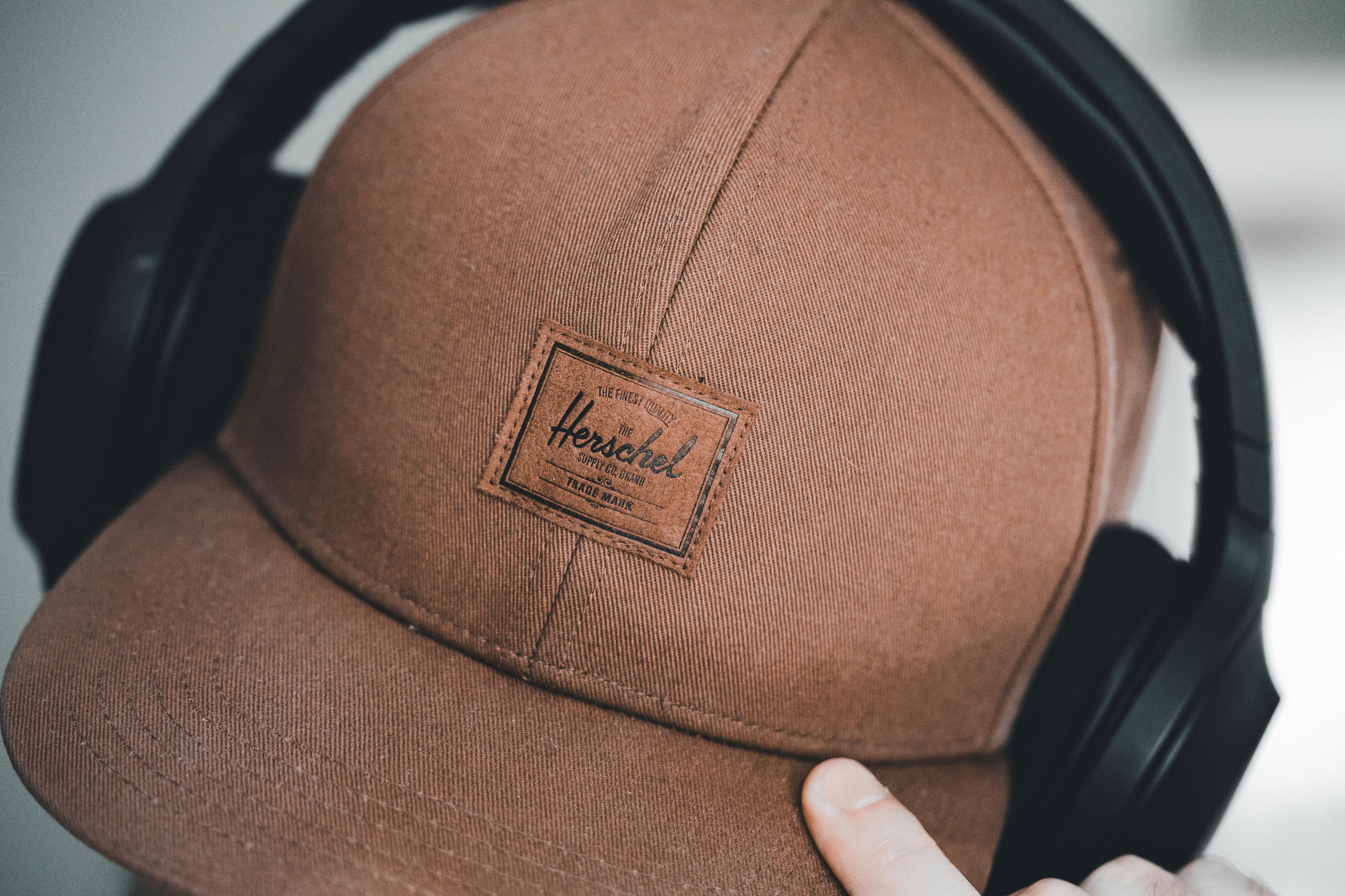 Close-up of Headphones Put on a Cap · Free Stock Photo