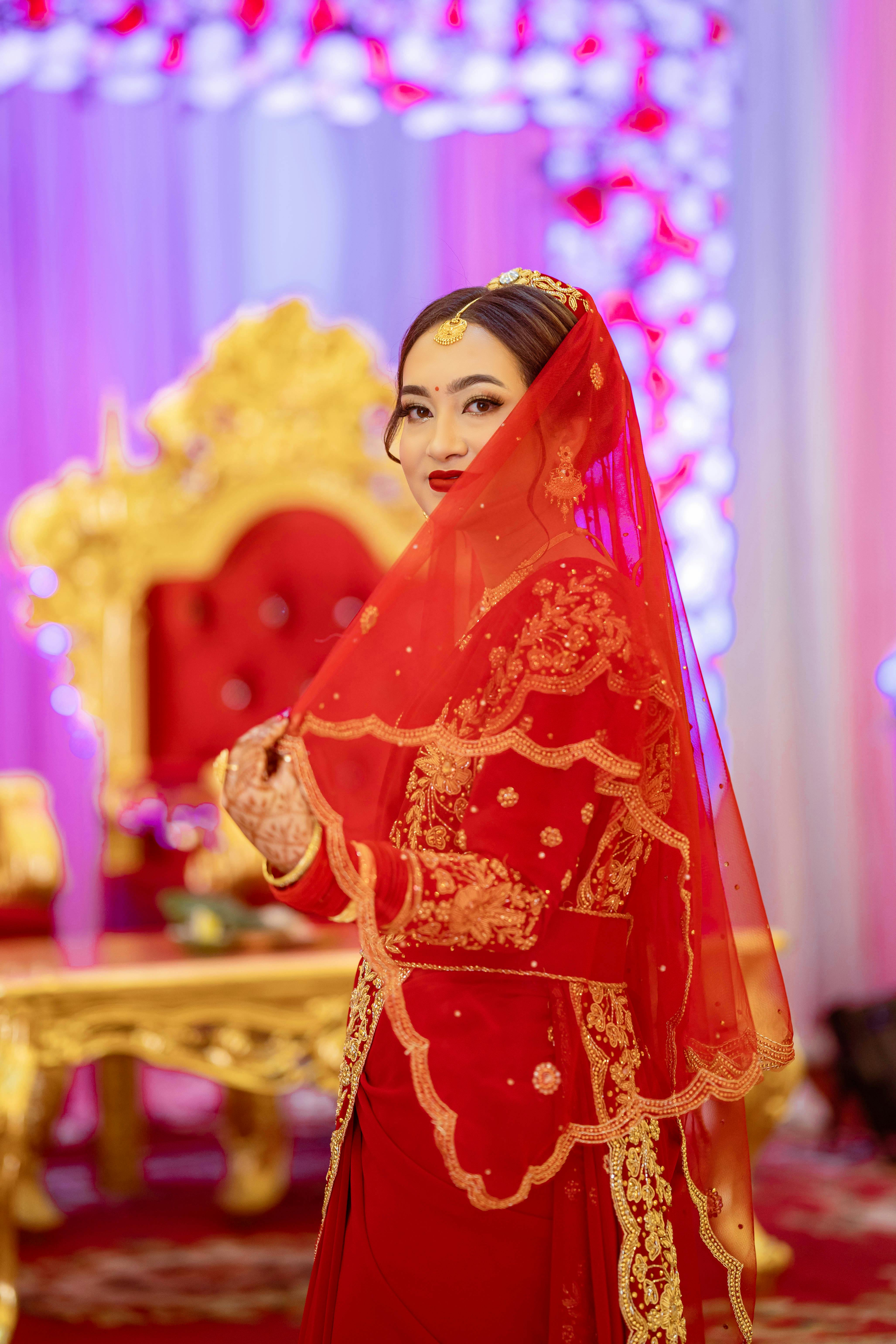 Young Woman in Red and Gold Indian Wedding Dress with Syphon Veil ...