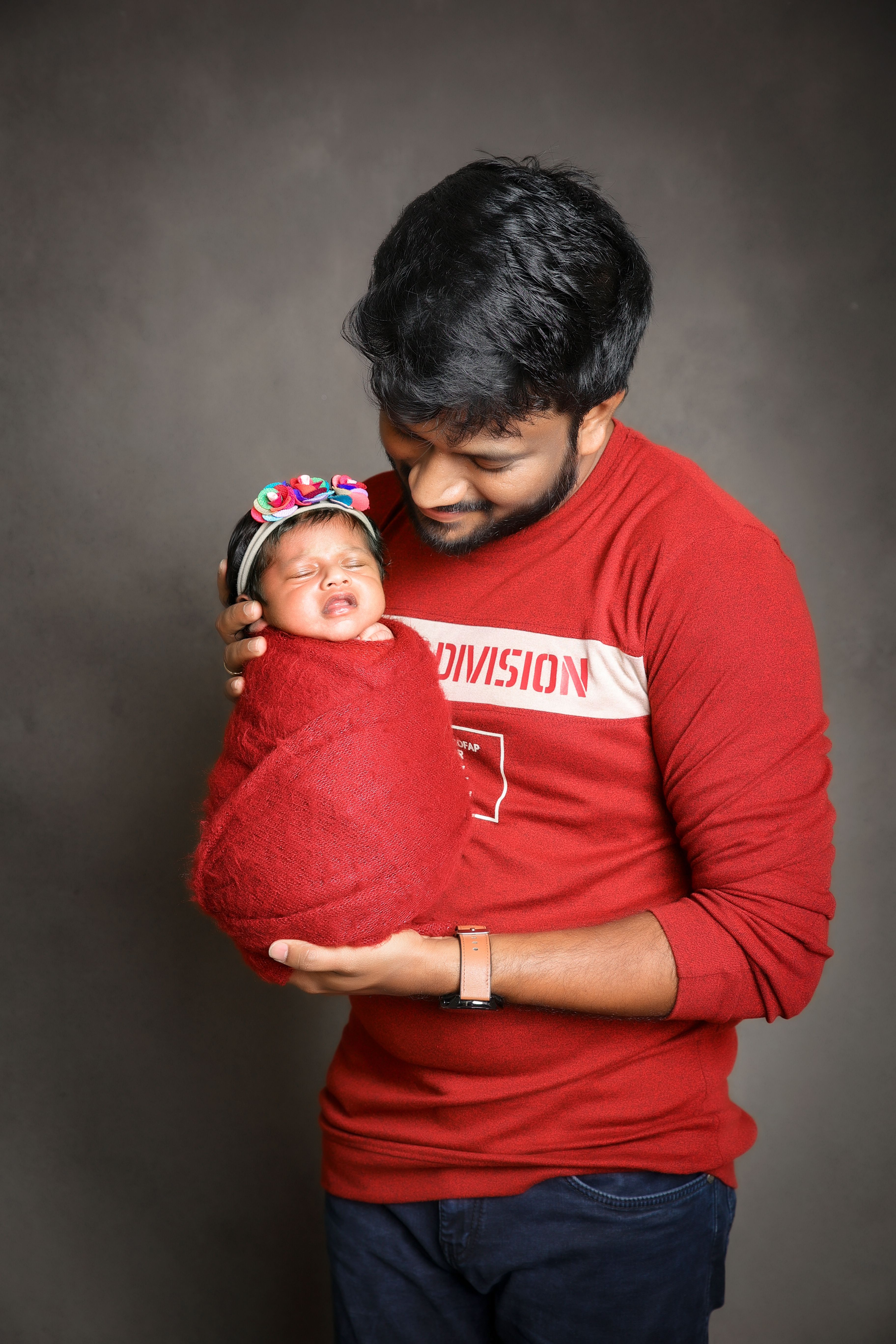 Man Carrying a Baby · Free Stock Photo