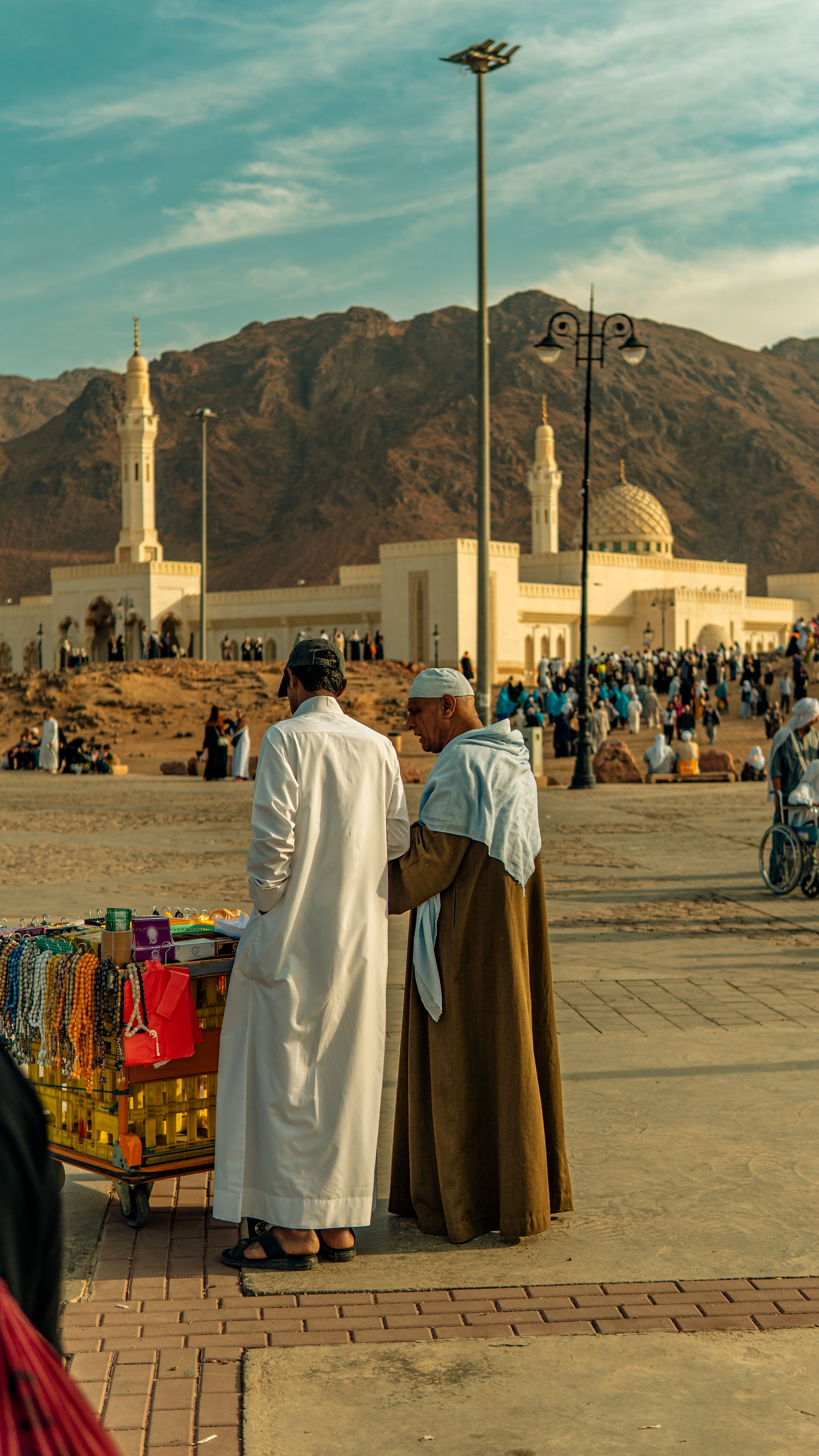 A Crowd in front of a Mosque and Uhud Mountain in Saudi Arabia · Free ...