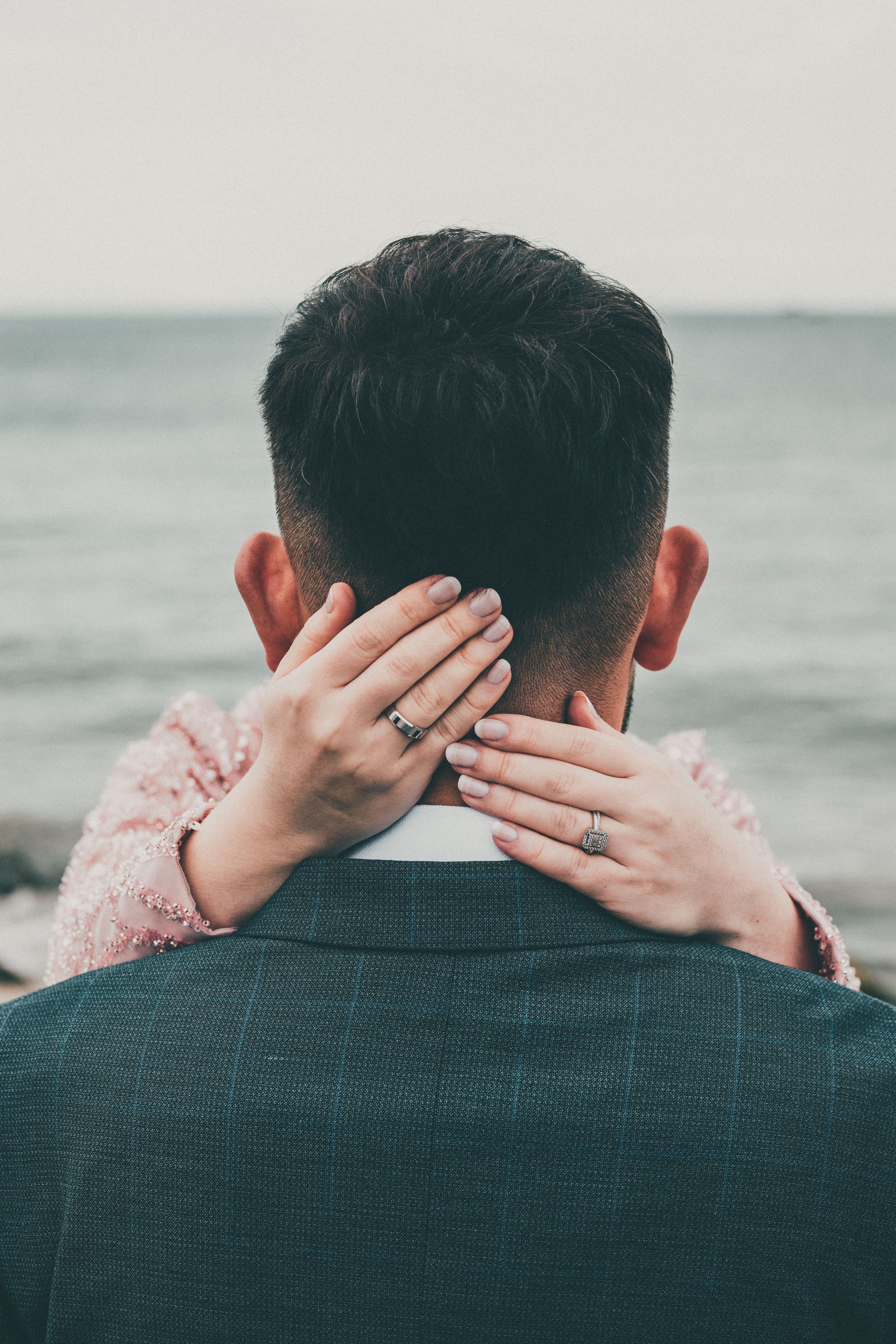 Back View of a Mans Head with Womans Hands Around His Neck · Free Stock ...