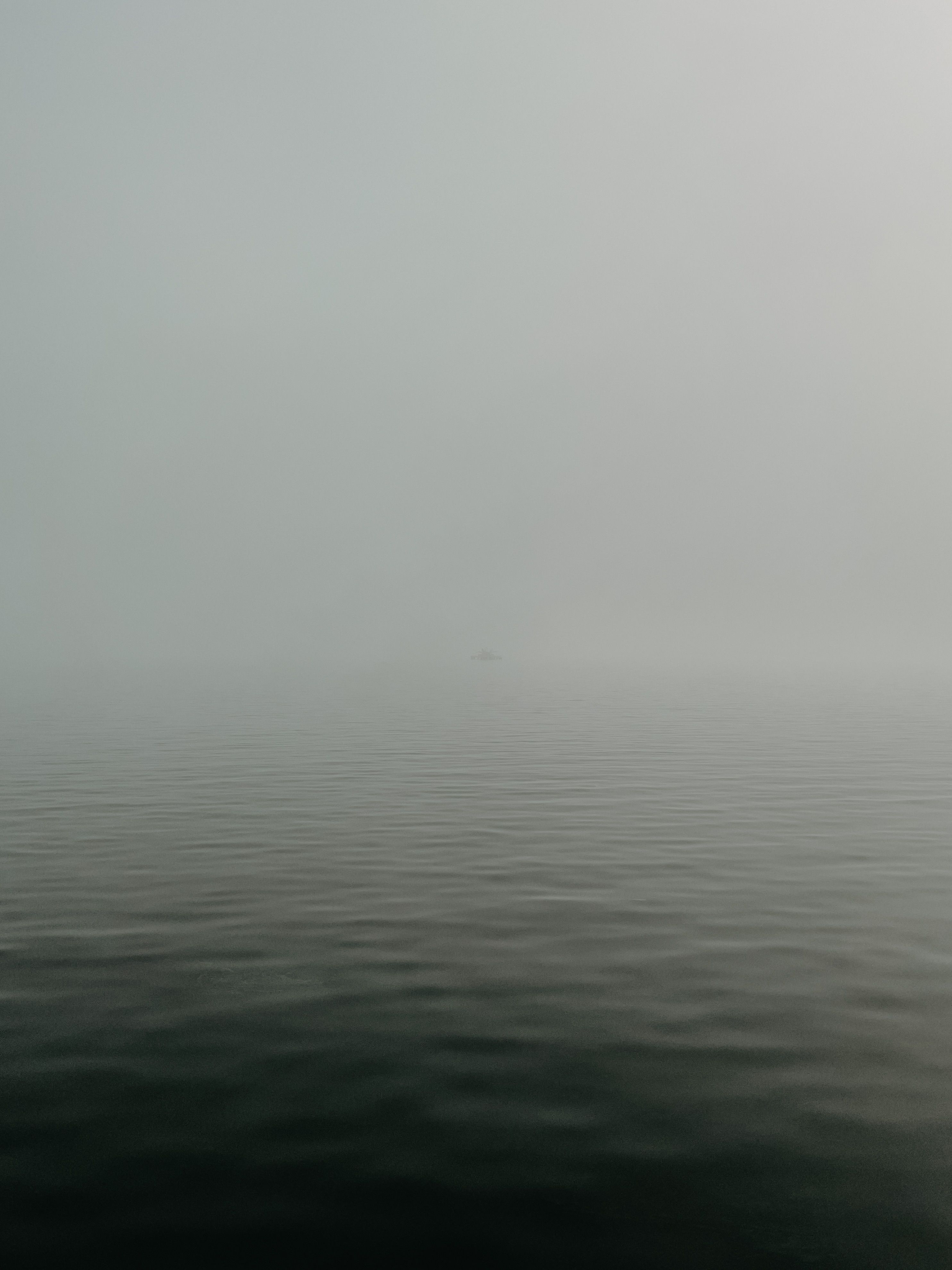 Body of Water Under Fog · Free Stock Photo