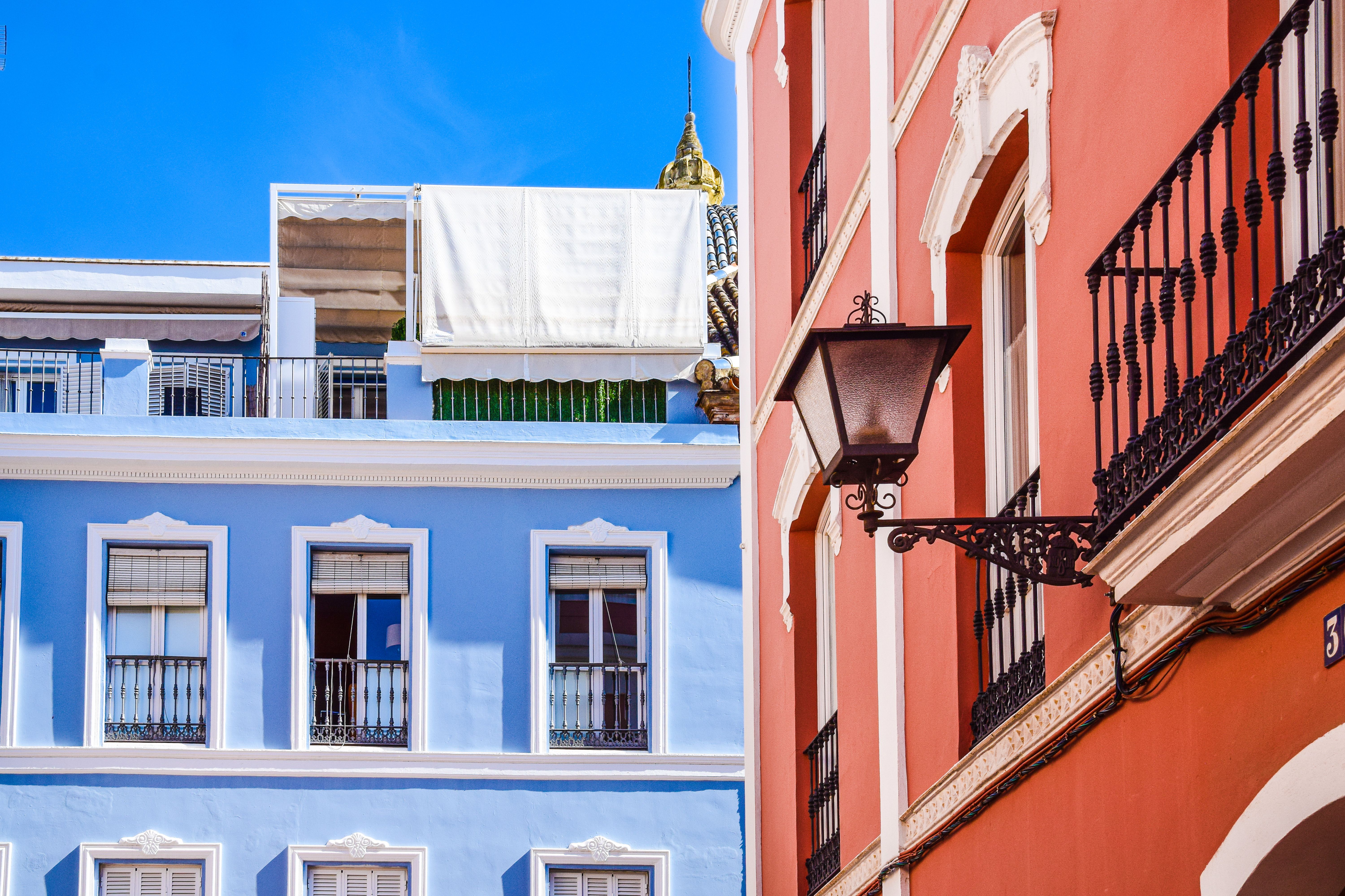 Red and Blue Buildings Walls in Town · Free Stock Photo