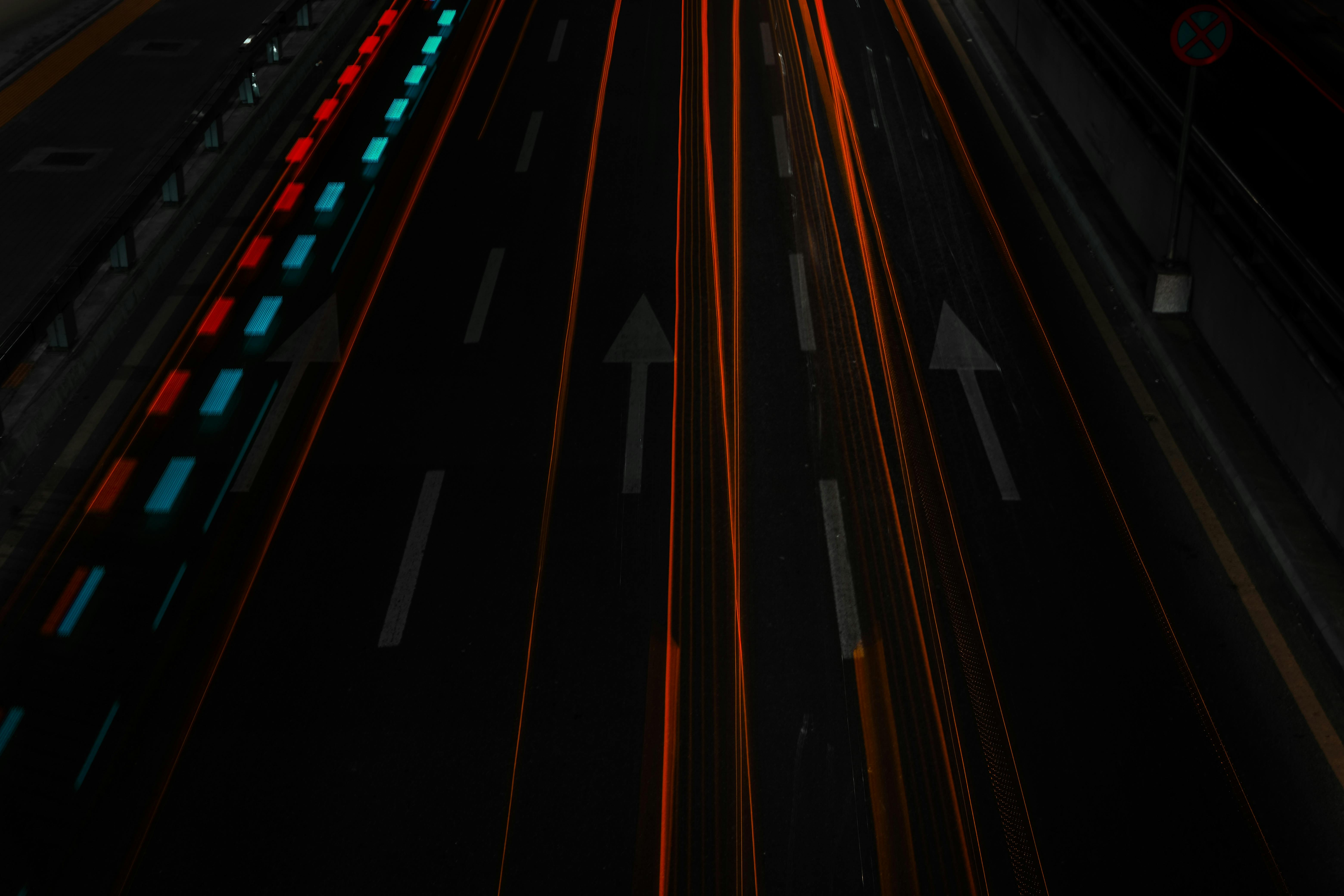 A long exposure of a highway with cars · Free Stock Photo