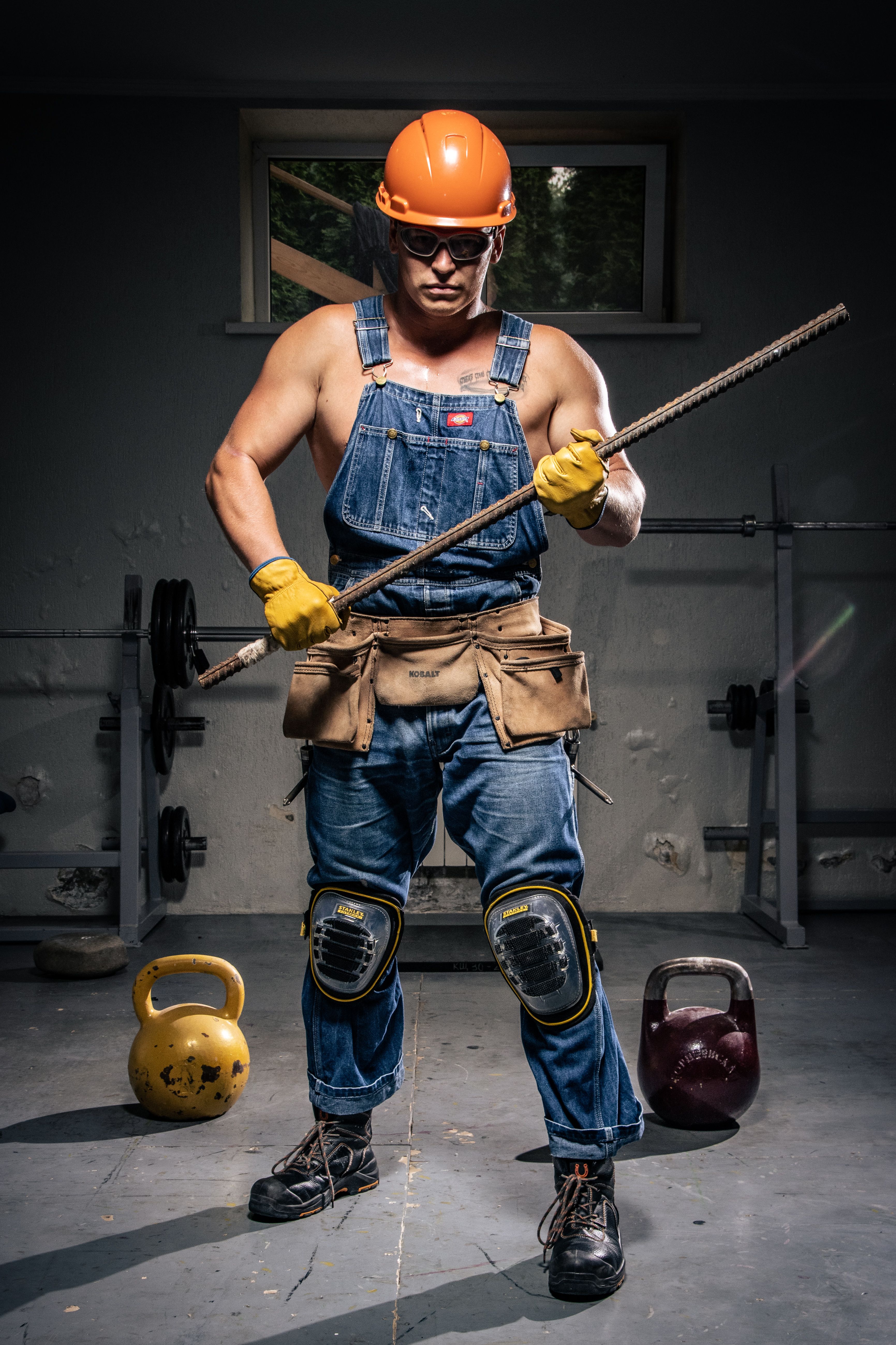 Man in Worker Helmet at Gym · Free Stock Photo