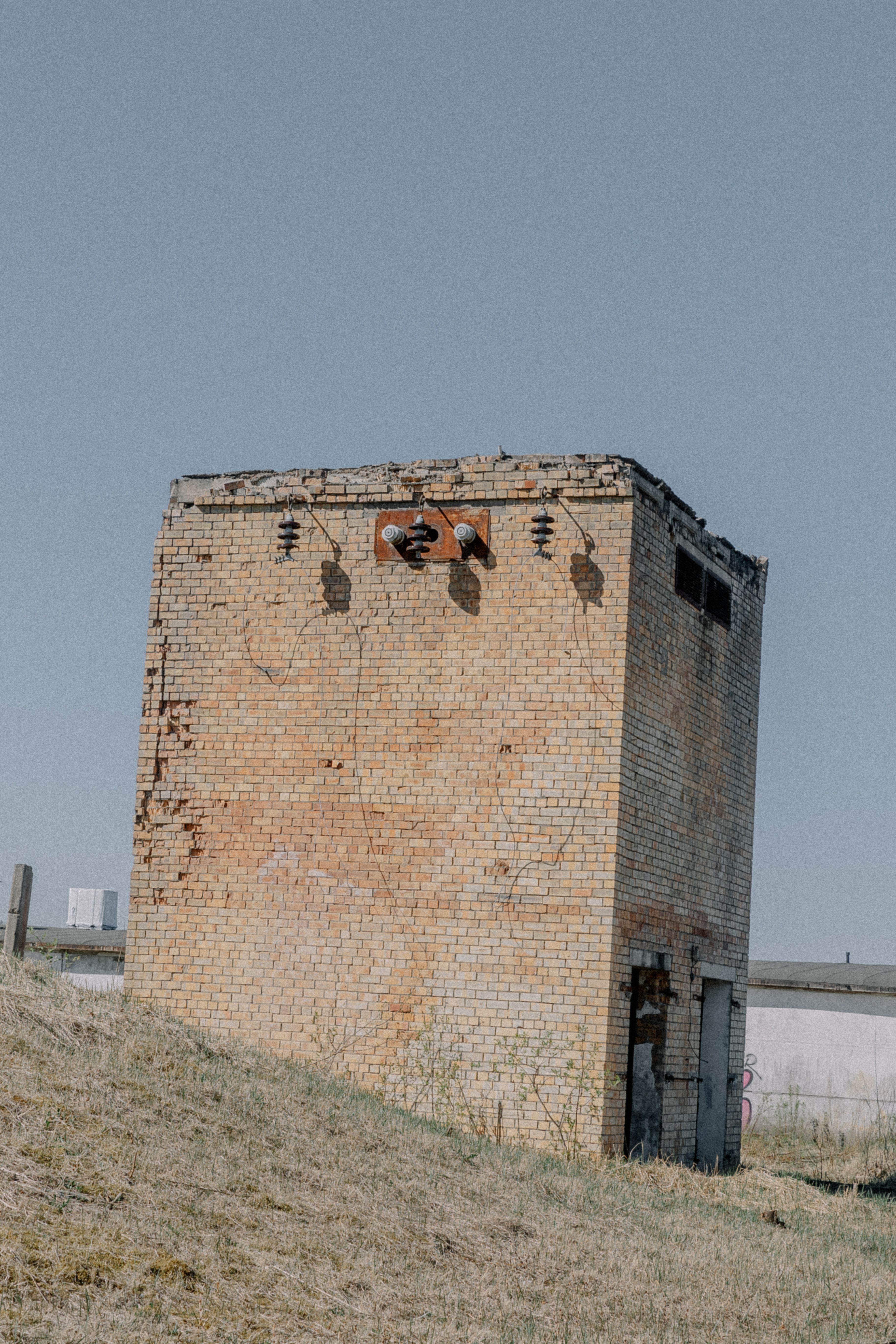 A Brick Building of Transformer Station · Free Stock Photo