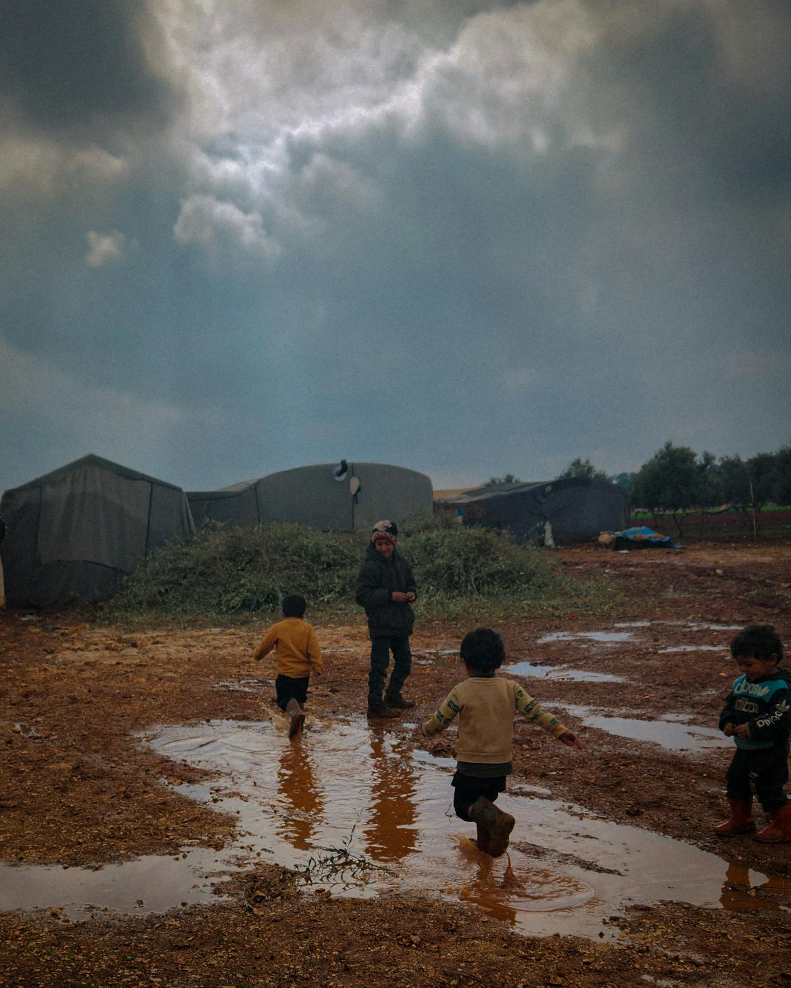 Children Playing In Puddles Photos, Download The BEST Free Children ...