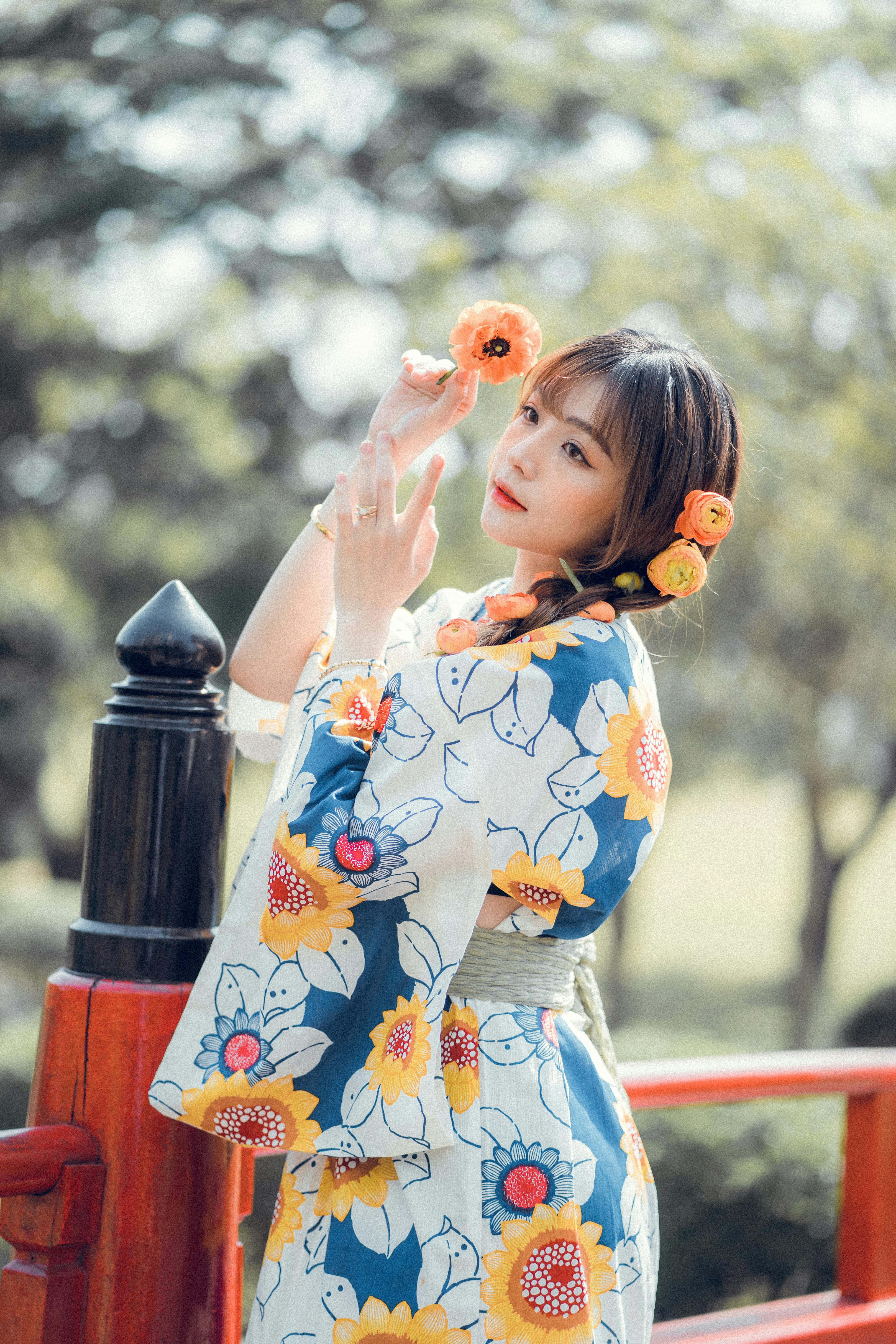 Woman Posing in Traditional Clothing · Free Stock Photo