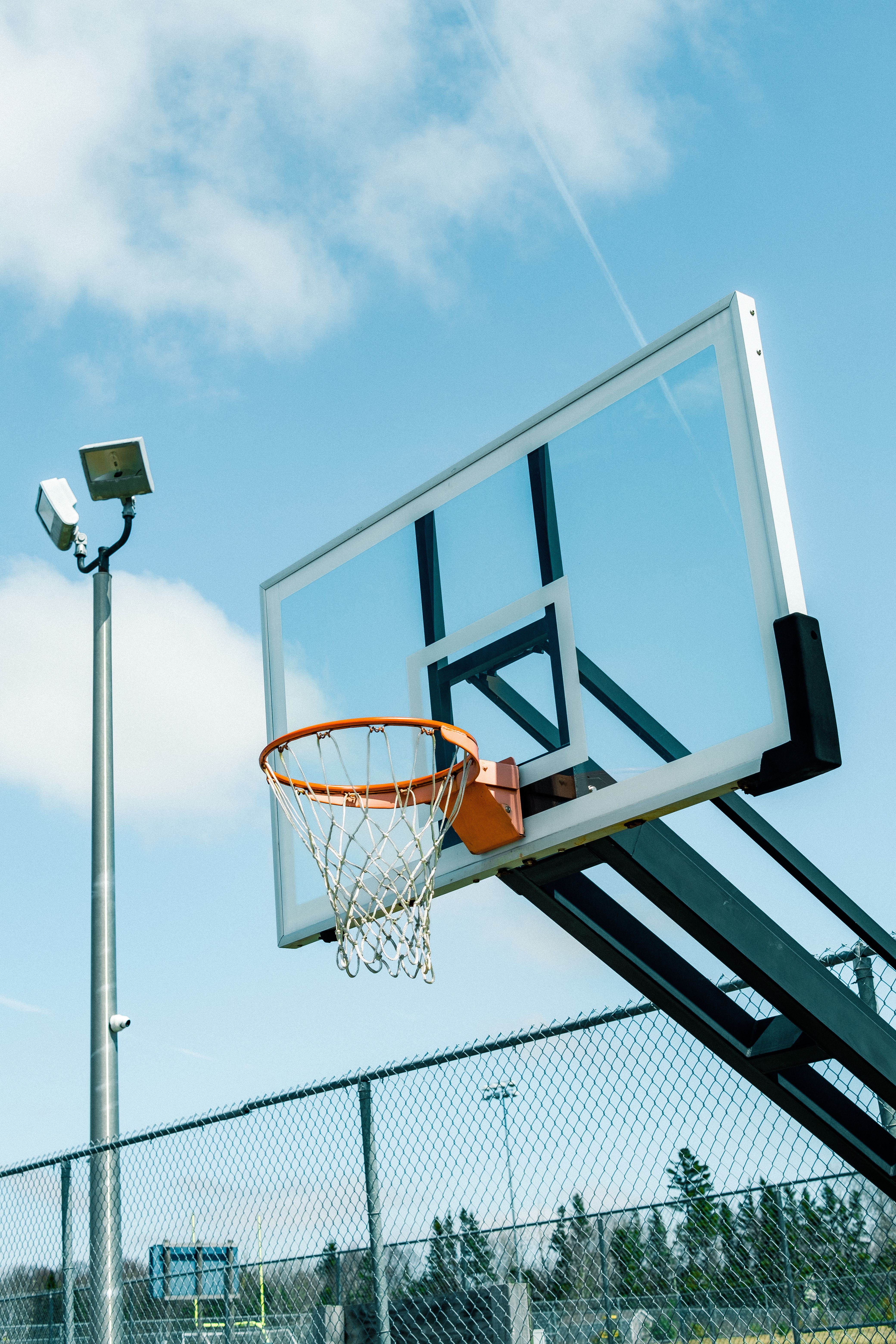 Basketball hoop for practicing active sport in park · Free Stock Photo