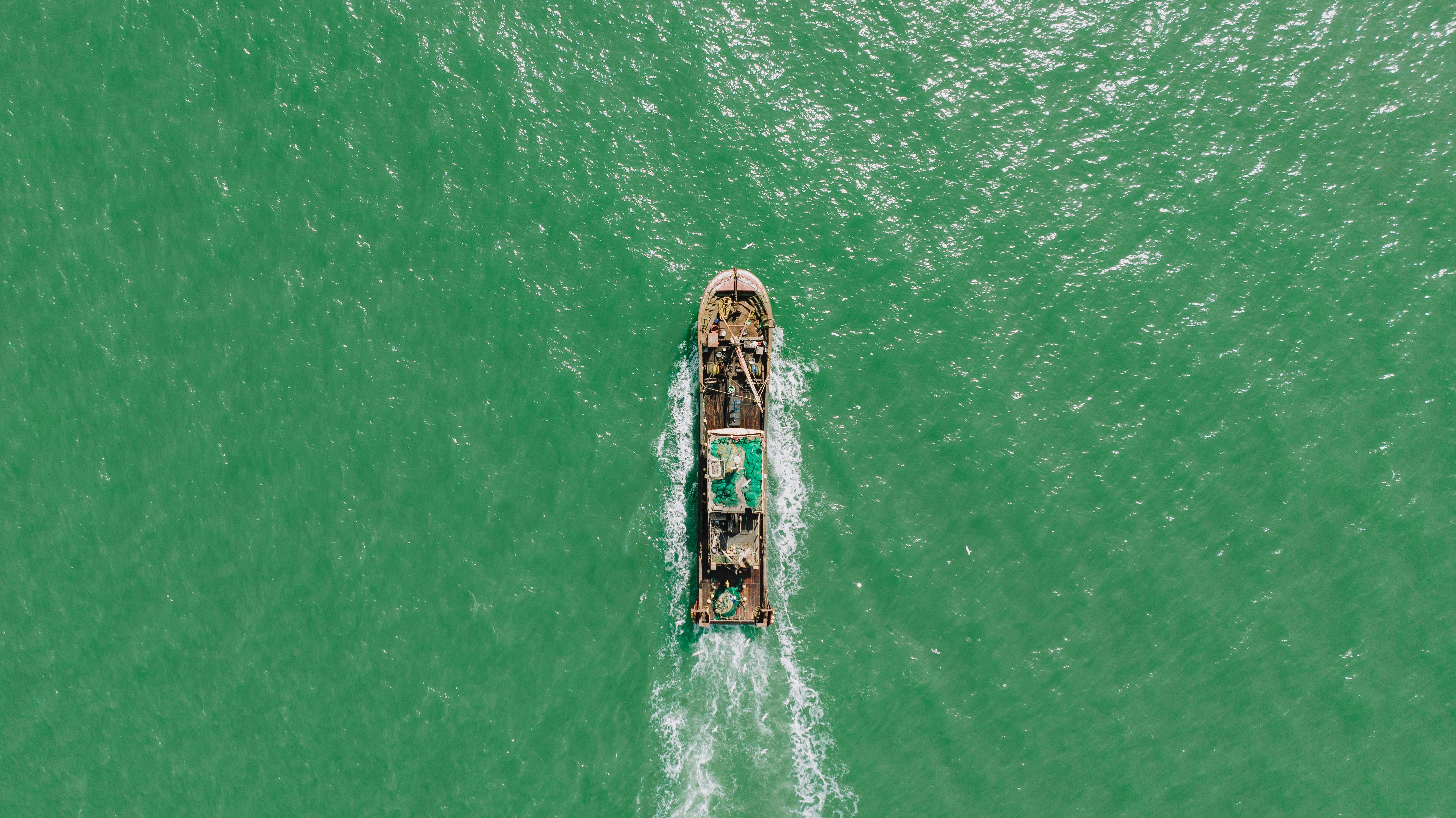 Rusty Boat on Lake in Birds Eye View · Free Stock Photo