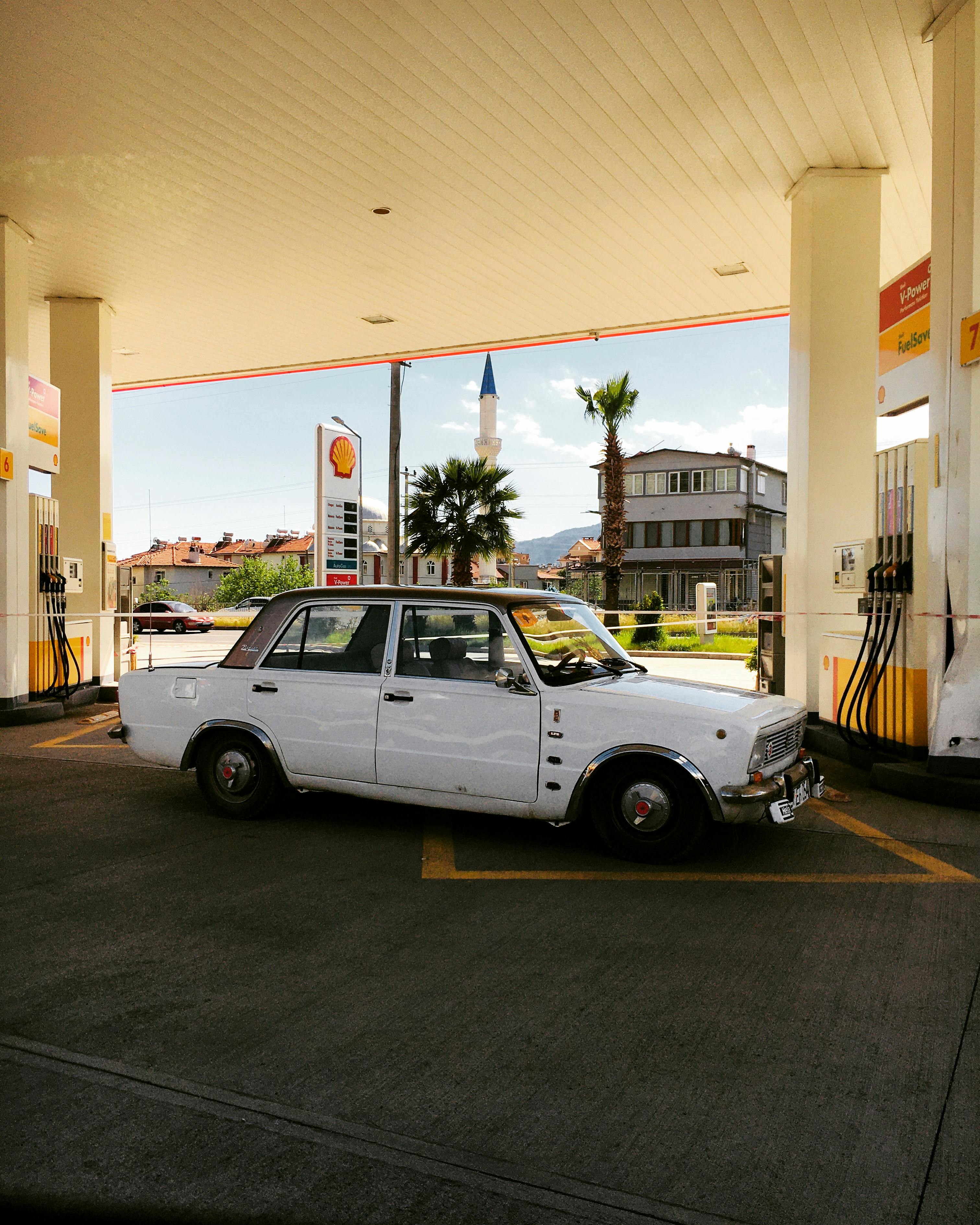 Person Holding Gasoline Nozzle · Free Stock Photo