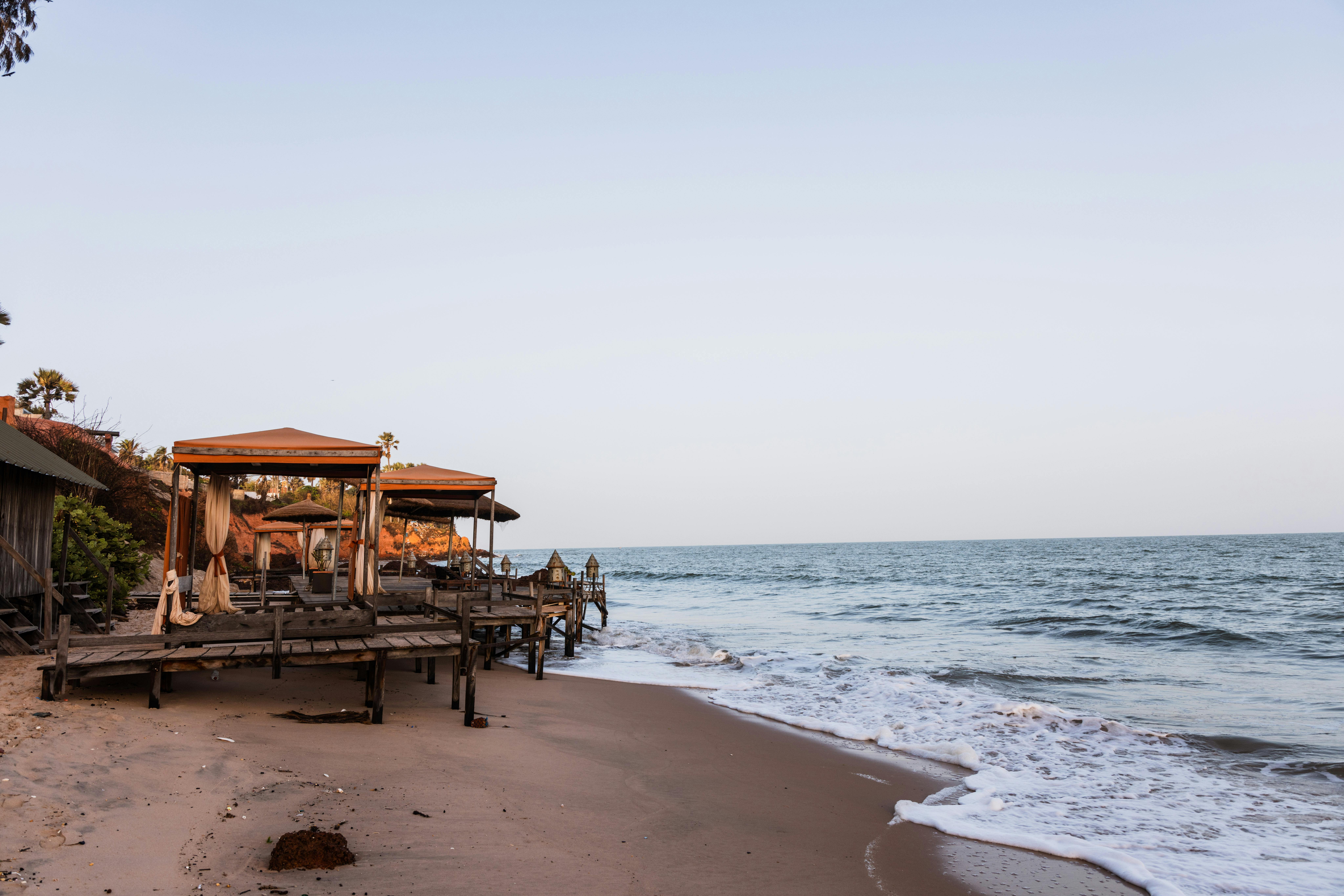Canopies over Pier on Beach · Free Stock Photo