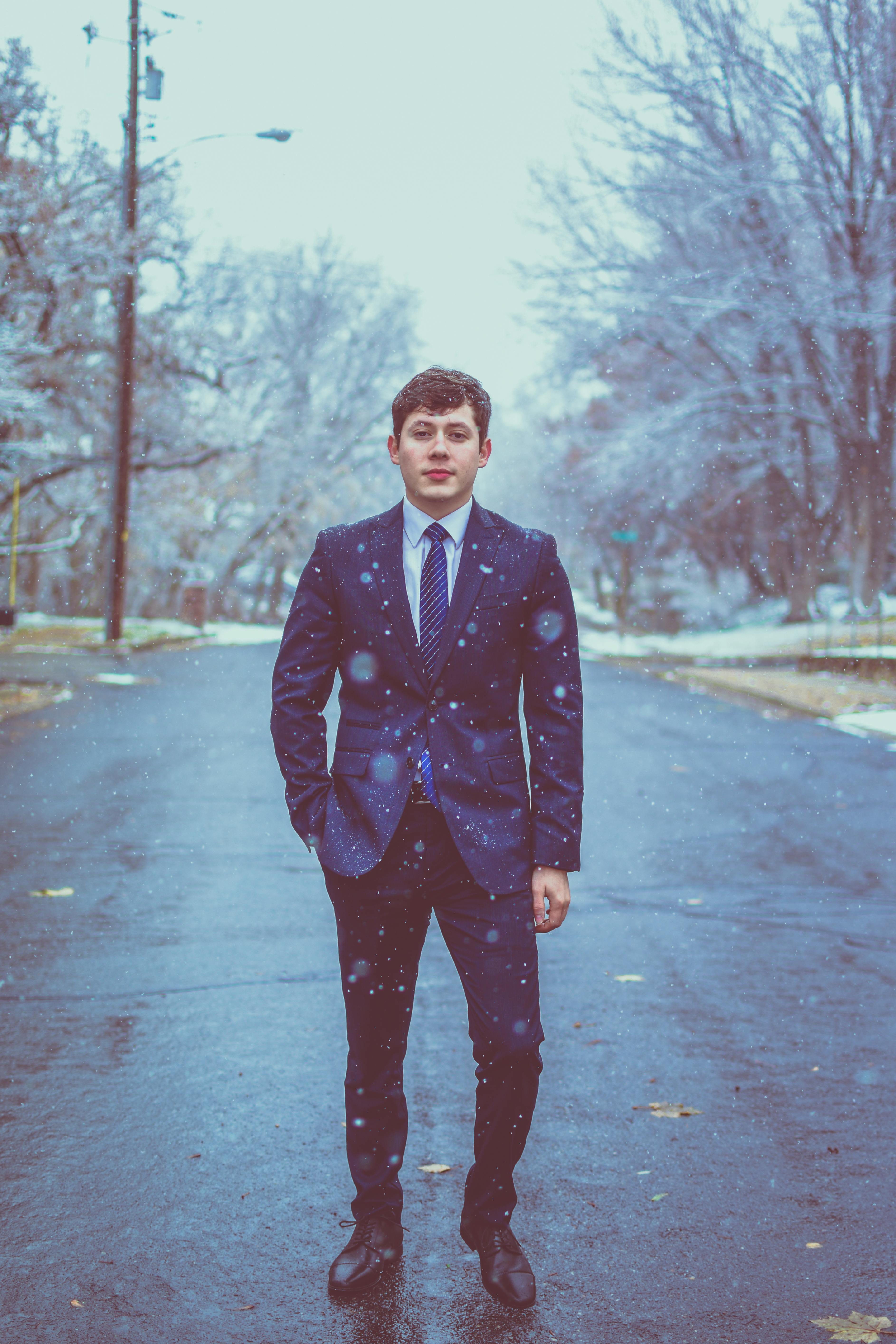 Standing Man Wearing Black and White Formal Suit · Free Stock Photo