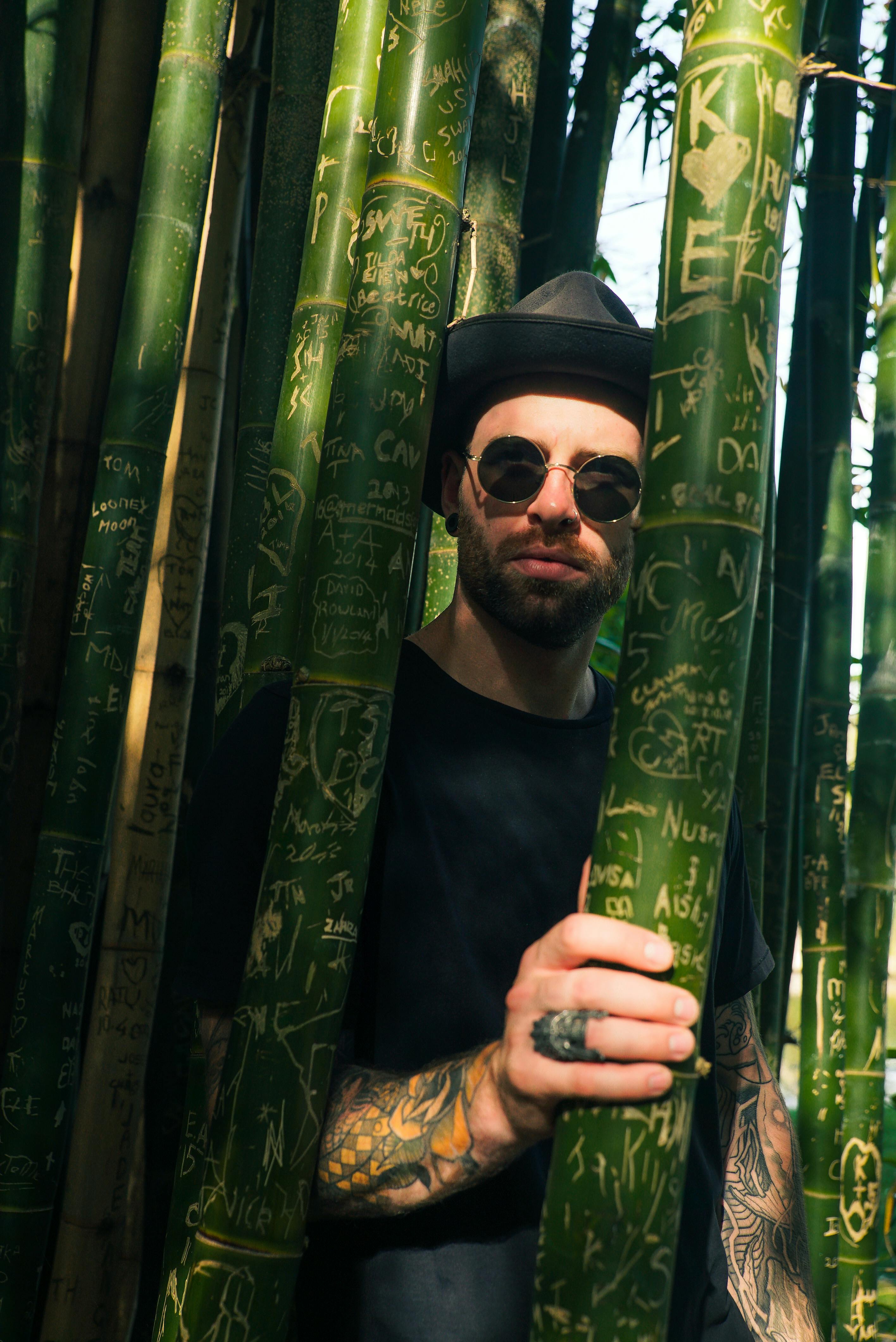 Man Through Bamboos · Free Stock Photo